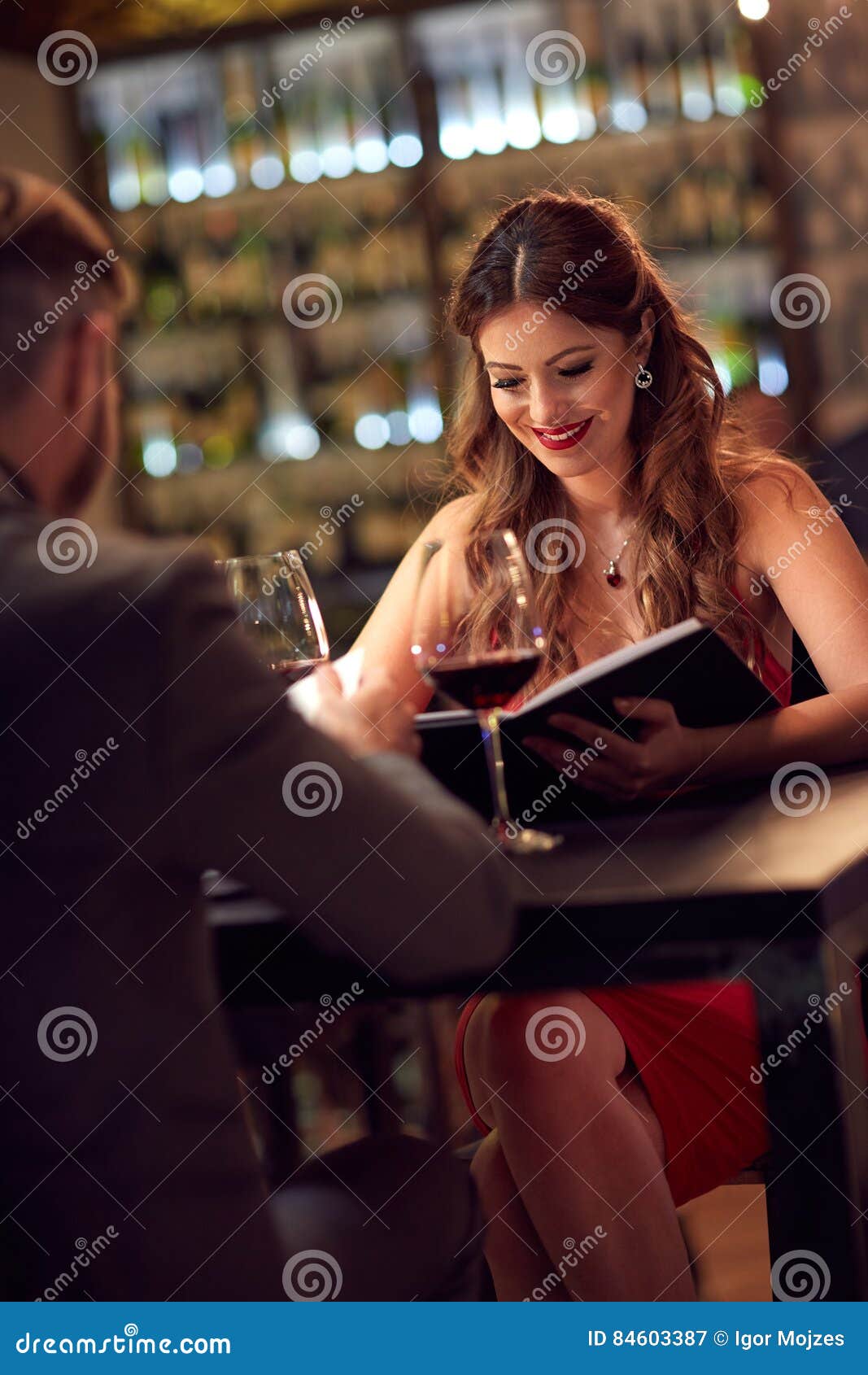 Girl Looking at Menu in Restaurant Stock Image - Image of date ...