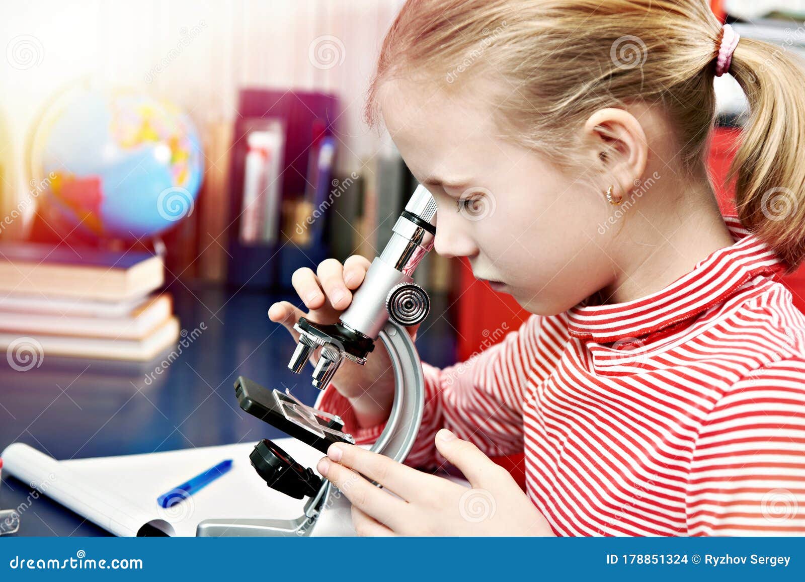 Girl Looking through Microscope Stock Photo - Image of looking ...