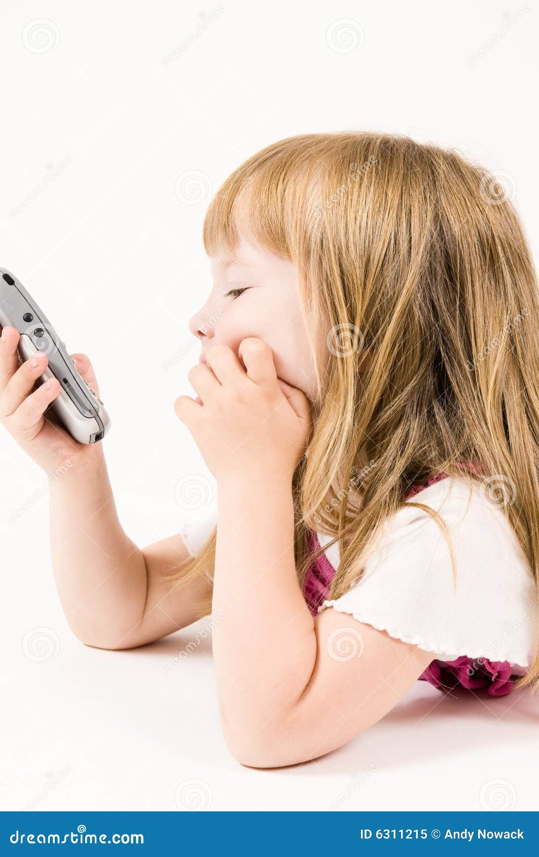 Girl looking at phone stock image. Image of serious, aloft - 6311215