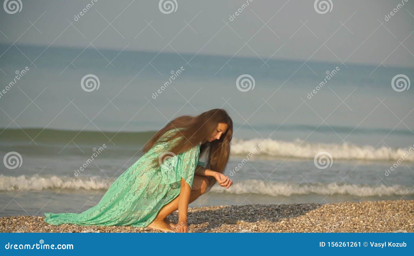 Girl looking for shells stock video. Video of nature - 156261261