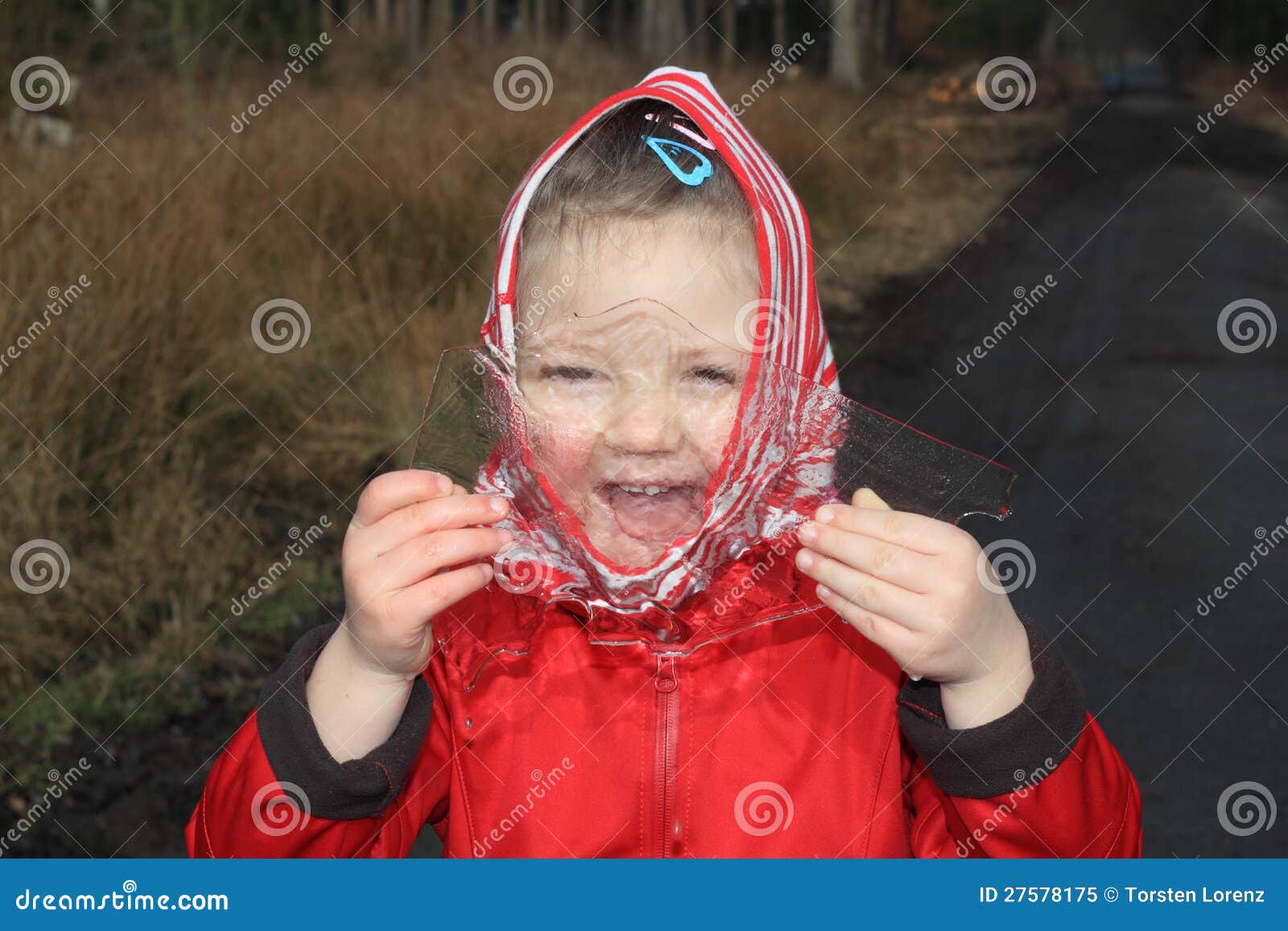 Girl looking though ice stock image. Image of frozen - 27578175