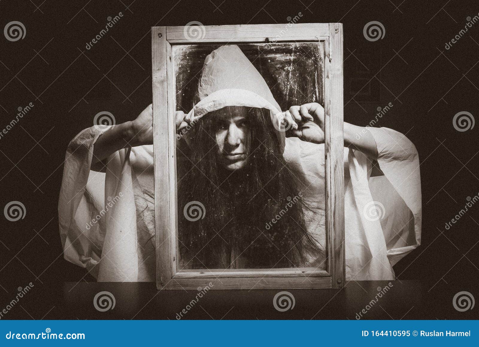 Girl Looking at the Viewer through the Frame. the Concept of ...