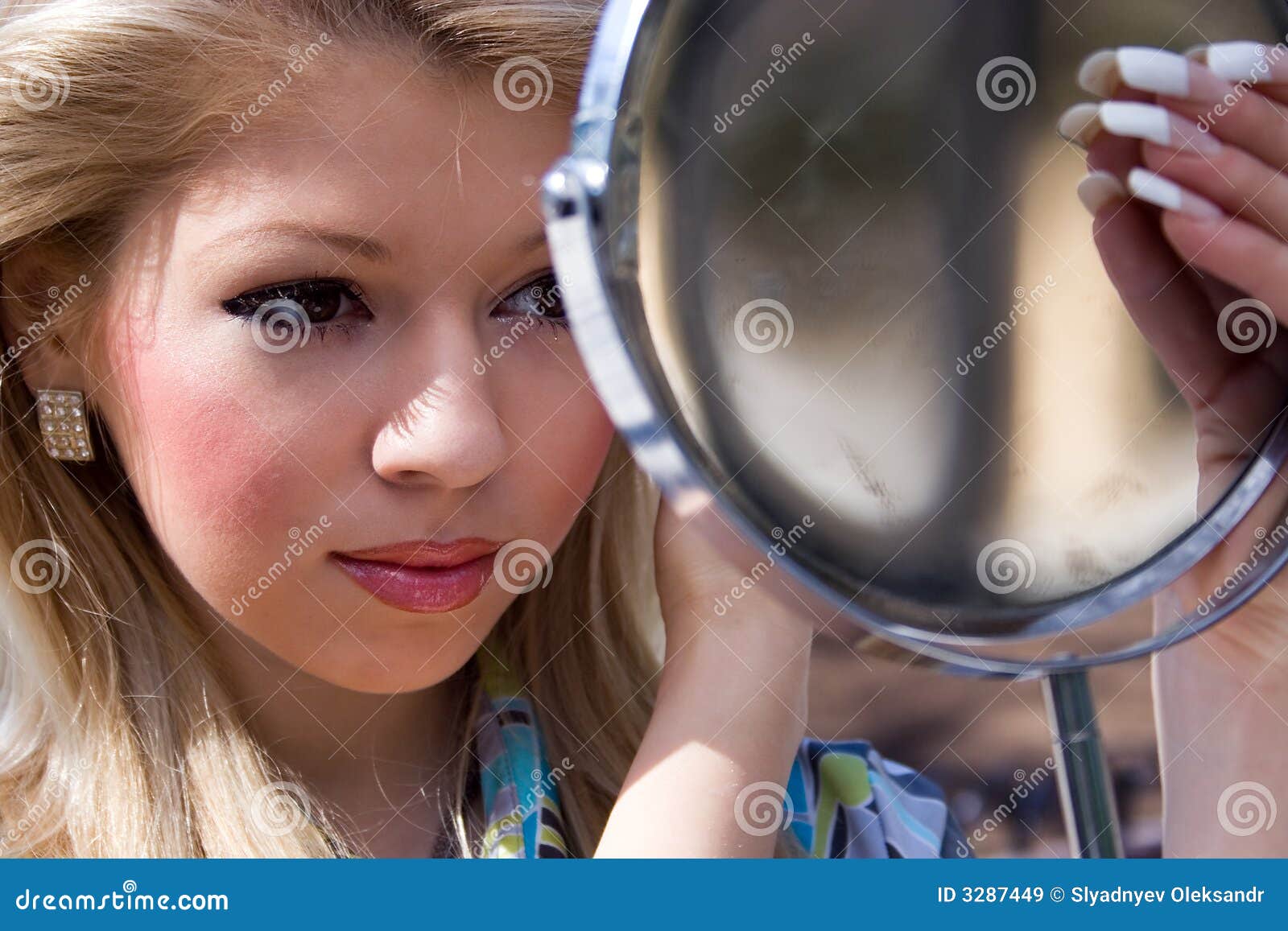 Girl looks in the mirror stock image. Image of human, outdoors - 3287449