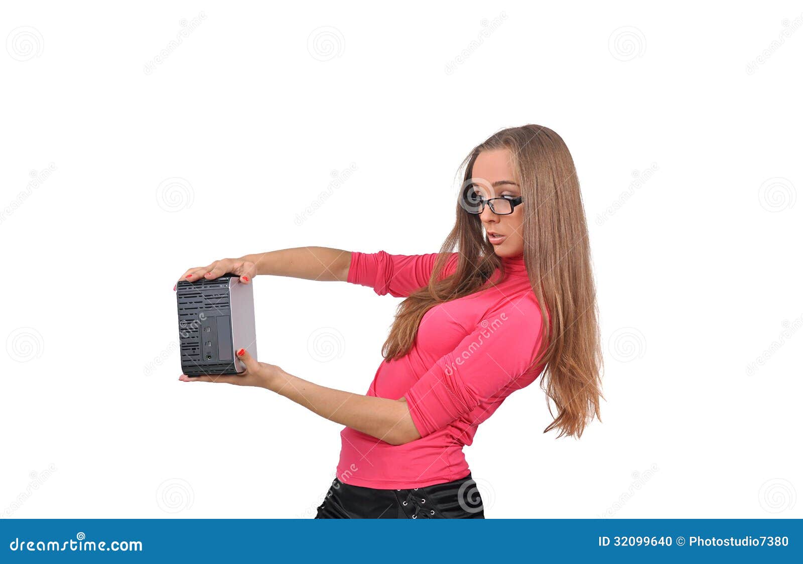 Girl Looks at an Object in Her Hands Stock Photo - Image of programmer ...