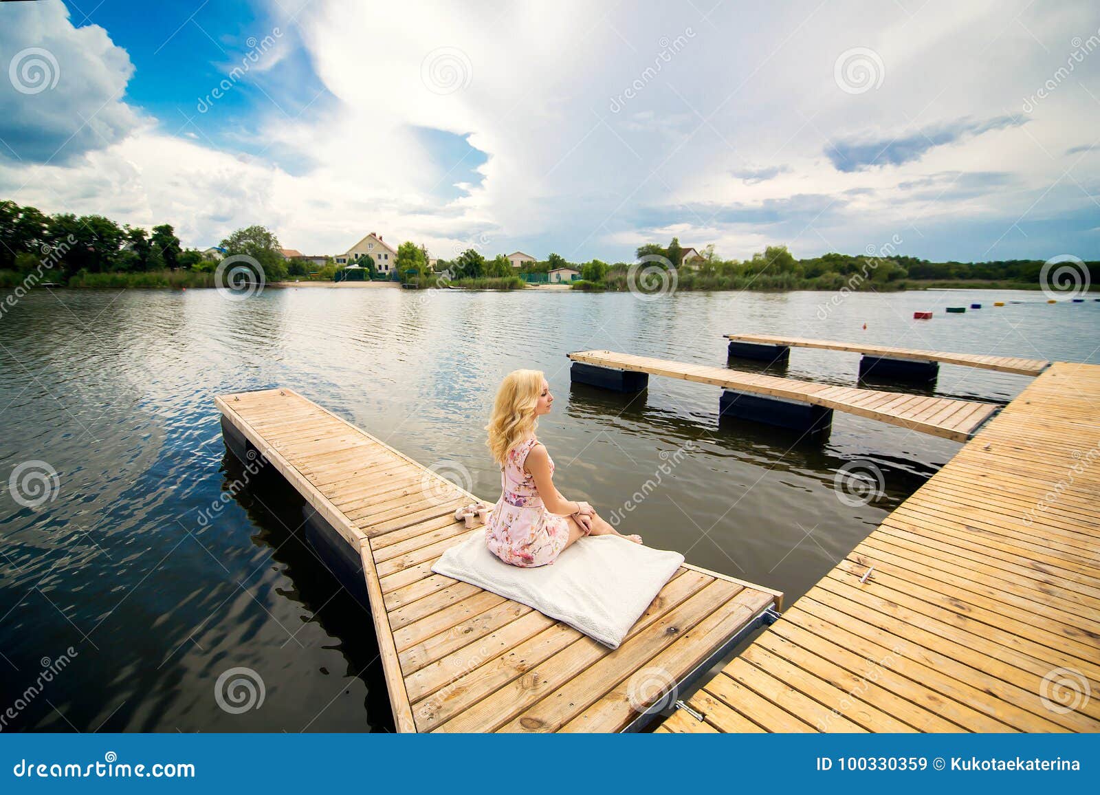 Girl Looks at the River Sitting on the Dock Stock Image - Image of rest ...