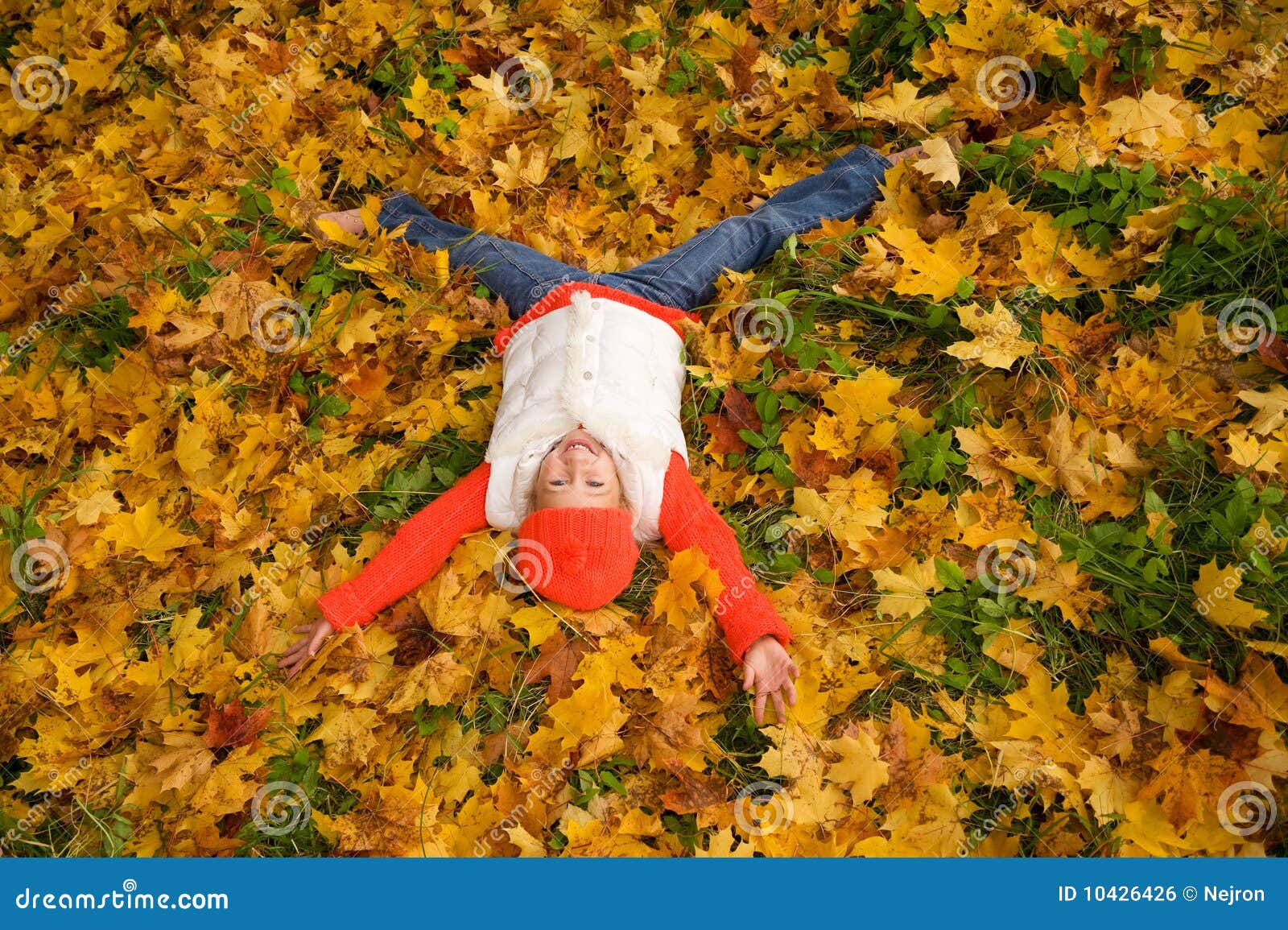 Girl Lying in Autumn Leaves Stock Photo - Image of forest, fall: 10426426