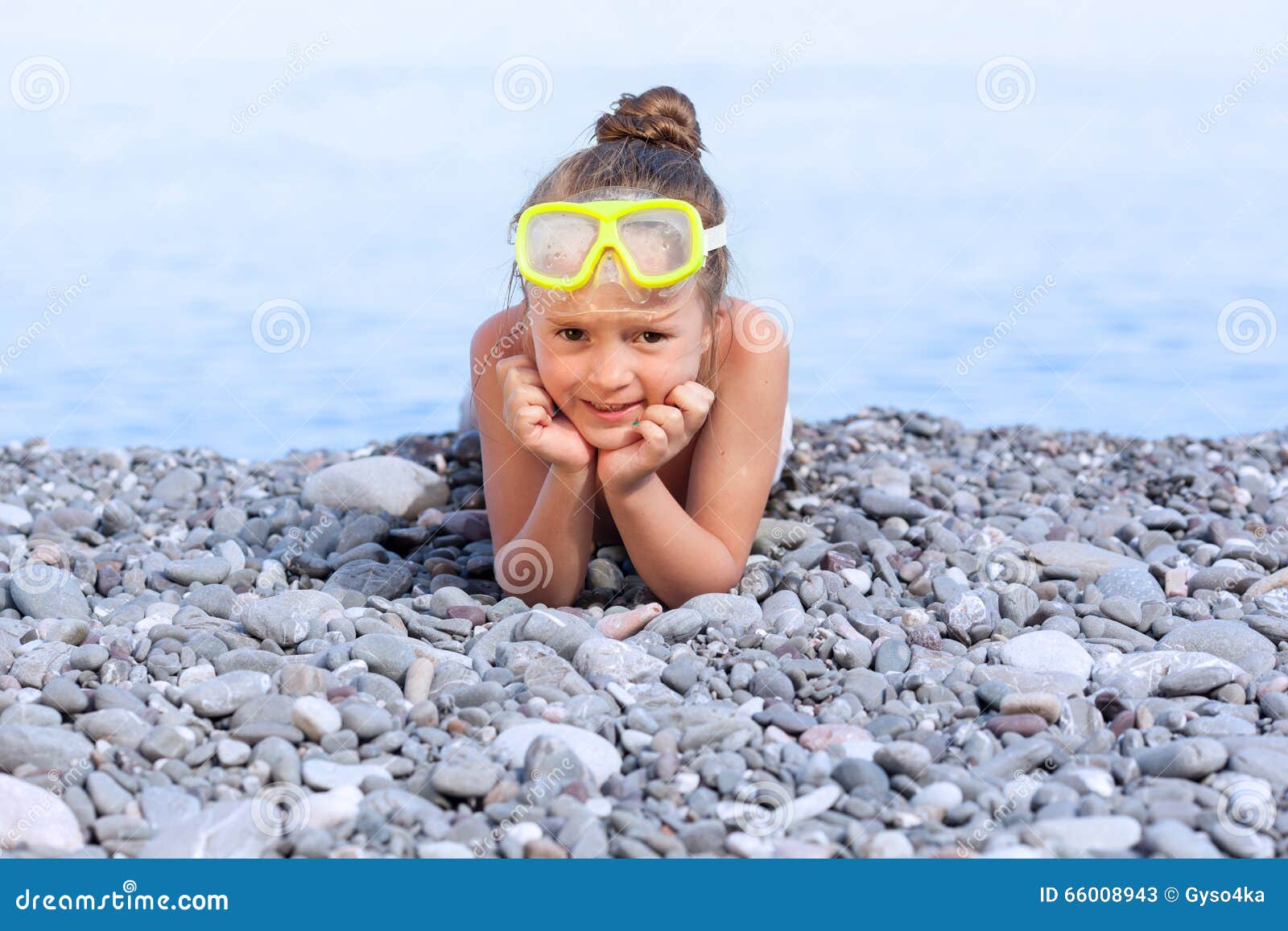 Girl lying on the beach stock image. Image of summer - 66008943