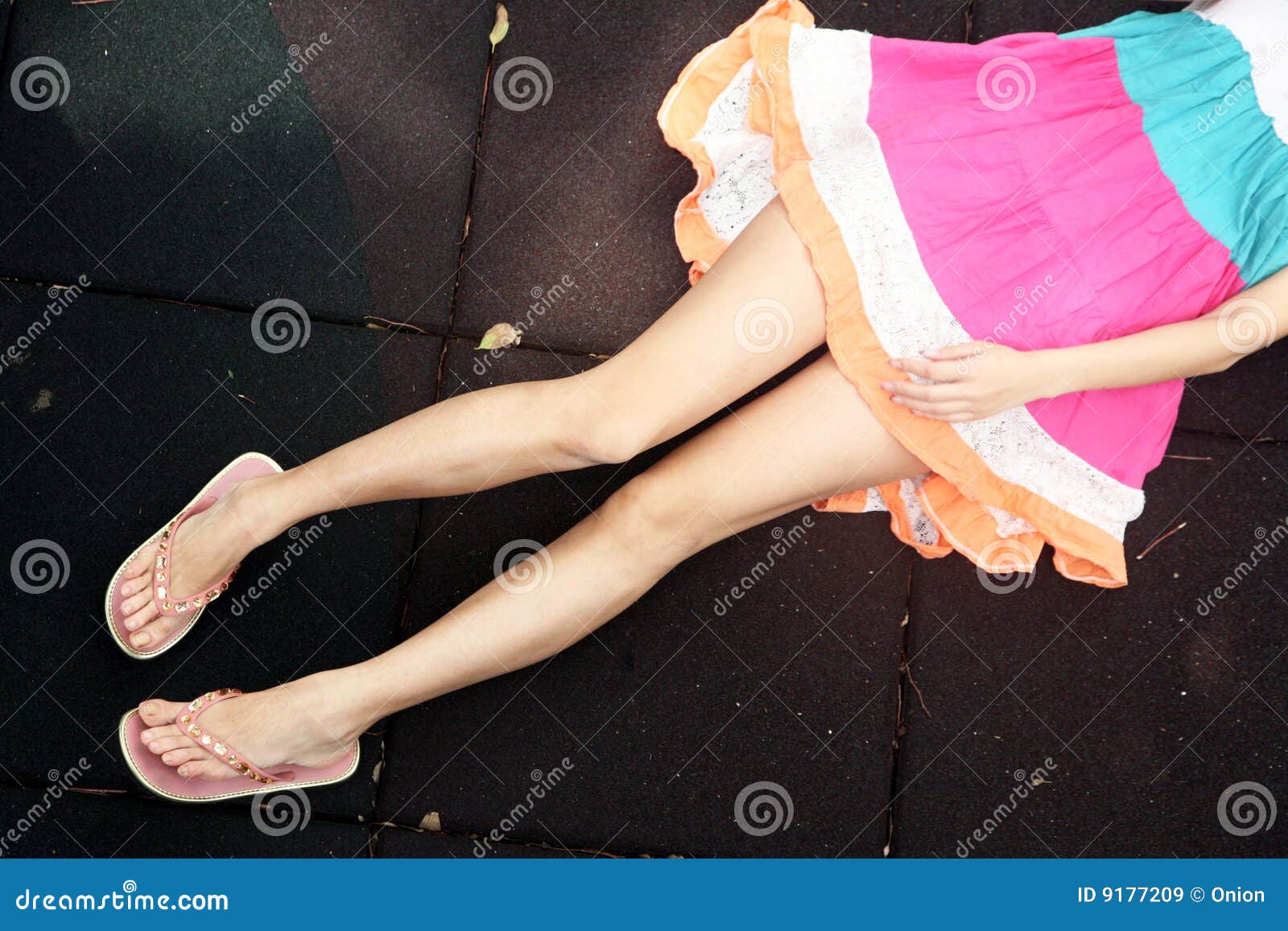 Girl Lying Down With A Colorful Dress Royalty Free Stock Images - Image ...