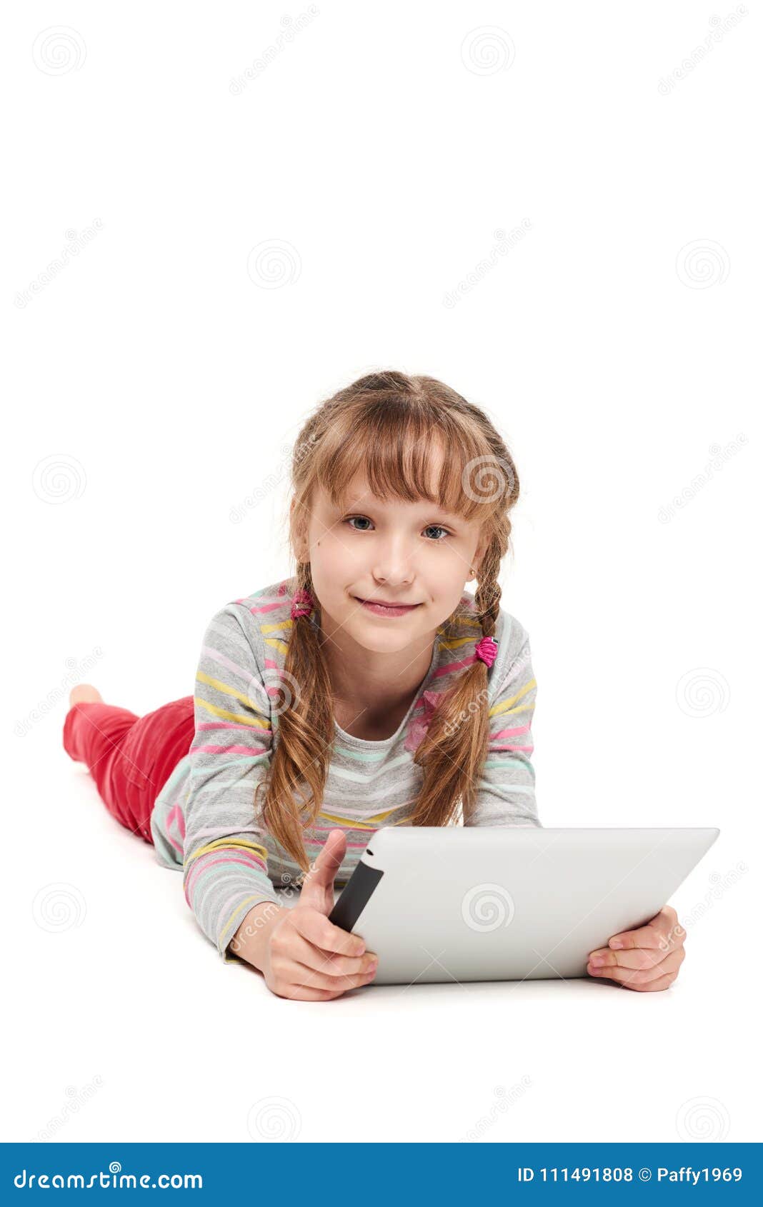 Girl Lying On The Floor With Tablet Computer Stock Photo - Image of ...