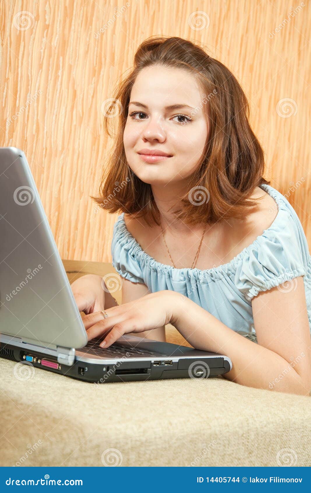 Girl lying with laptop stock photo. Image of network - 14405744