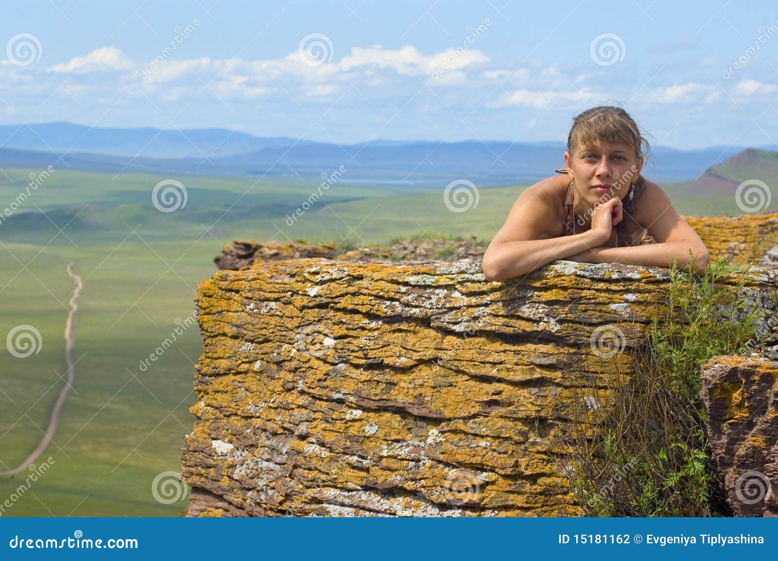Girl lying on a rock stock photo. Image of silence, travel - 15181162