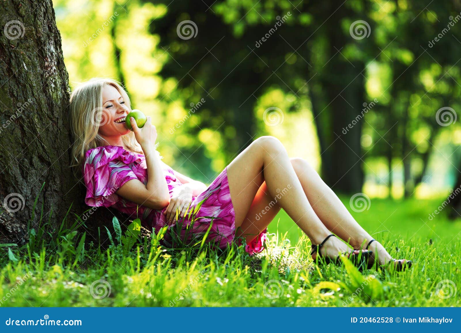 Girl lying under a tree stock photo. Image of hair, meadow - 20462528