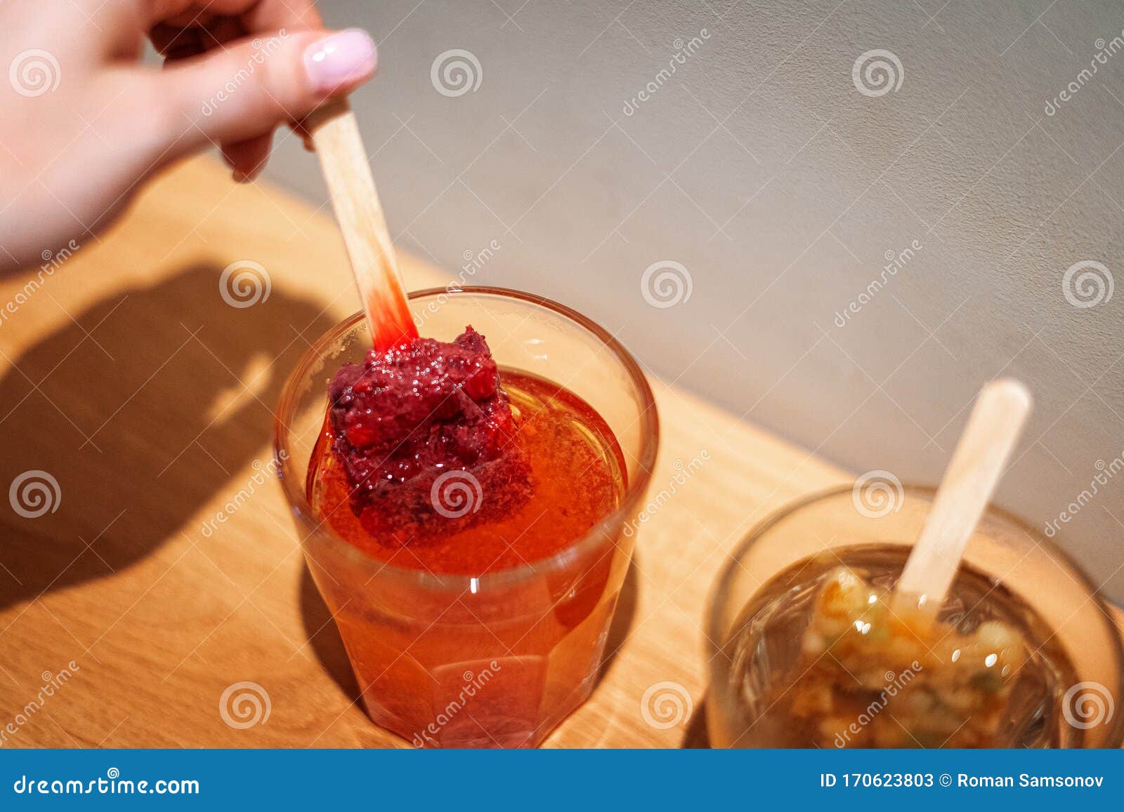 The Girl Makes Fruit Tea from Frozen Billets Stock Image - Image of ...