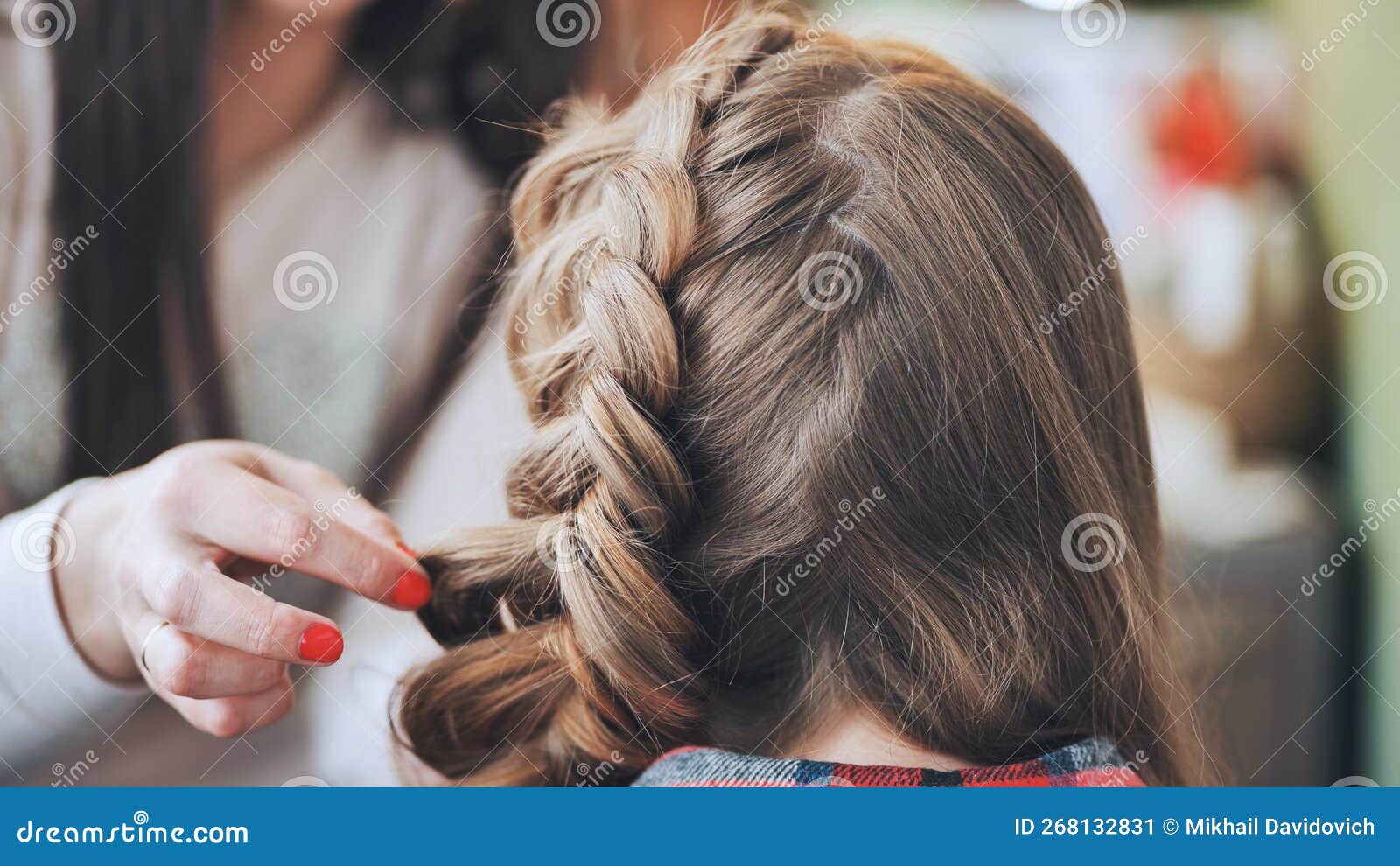 The Girl Makeup Artist Makes a Braid for the Model. Stock Image - Image ...