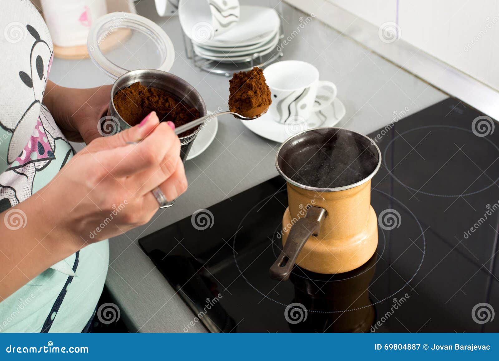 Girl is making coffee stock image. Image of girl, modern - 69804887