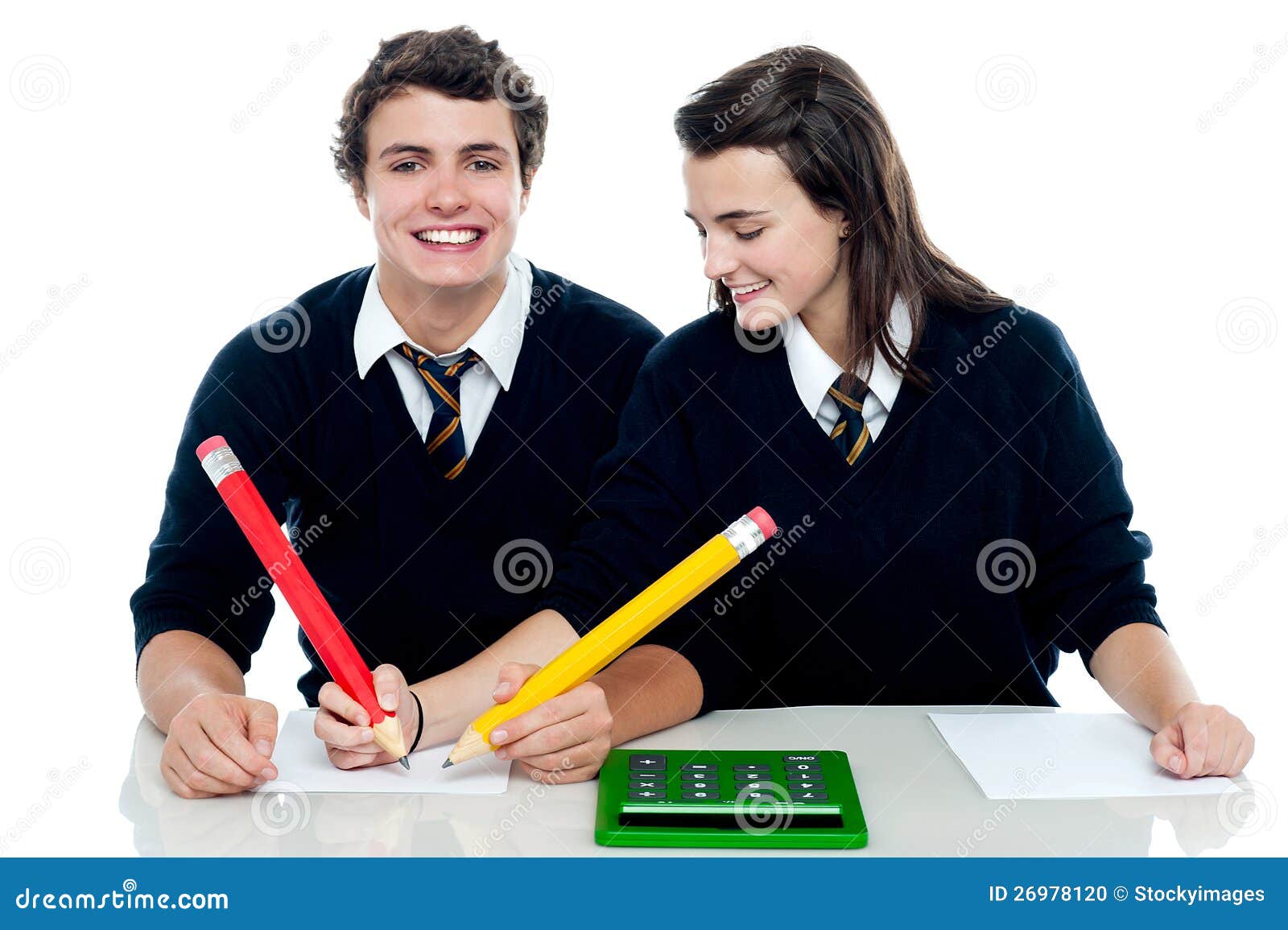 Girl Making Corrections on Her Partners Paper Stock Photo - Image of ...