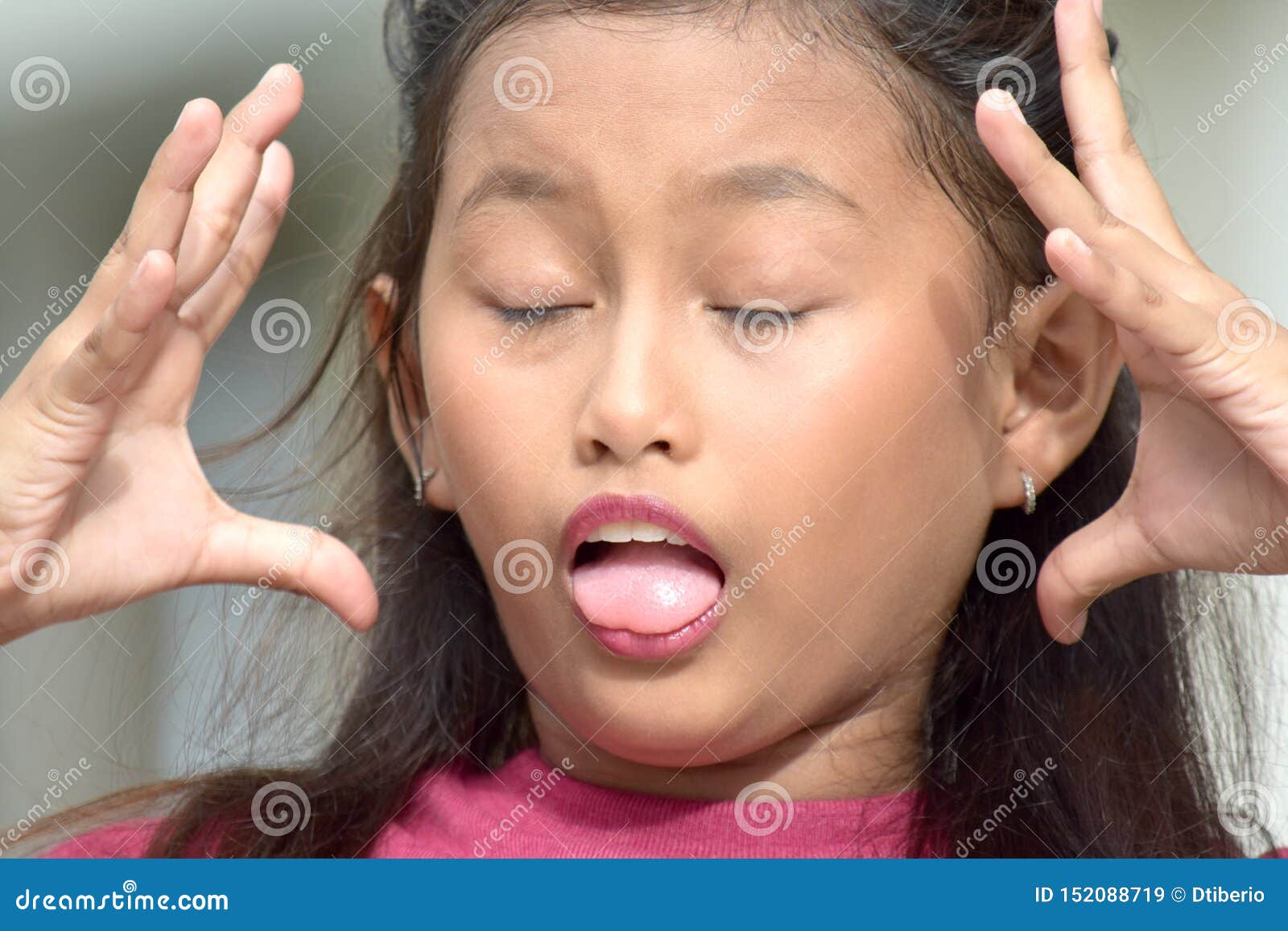 Girl Making Funny Faces stock image. Image of joyful - 152088719