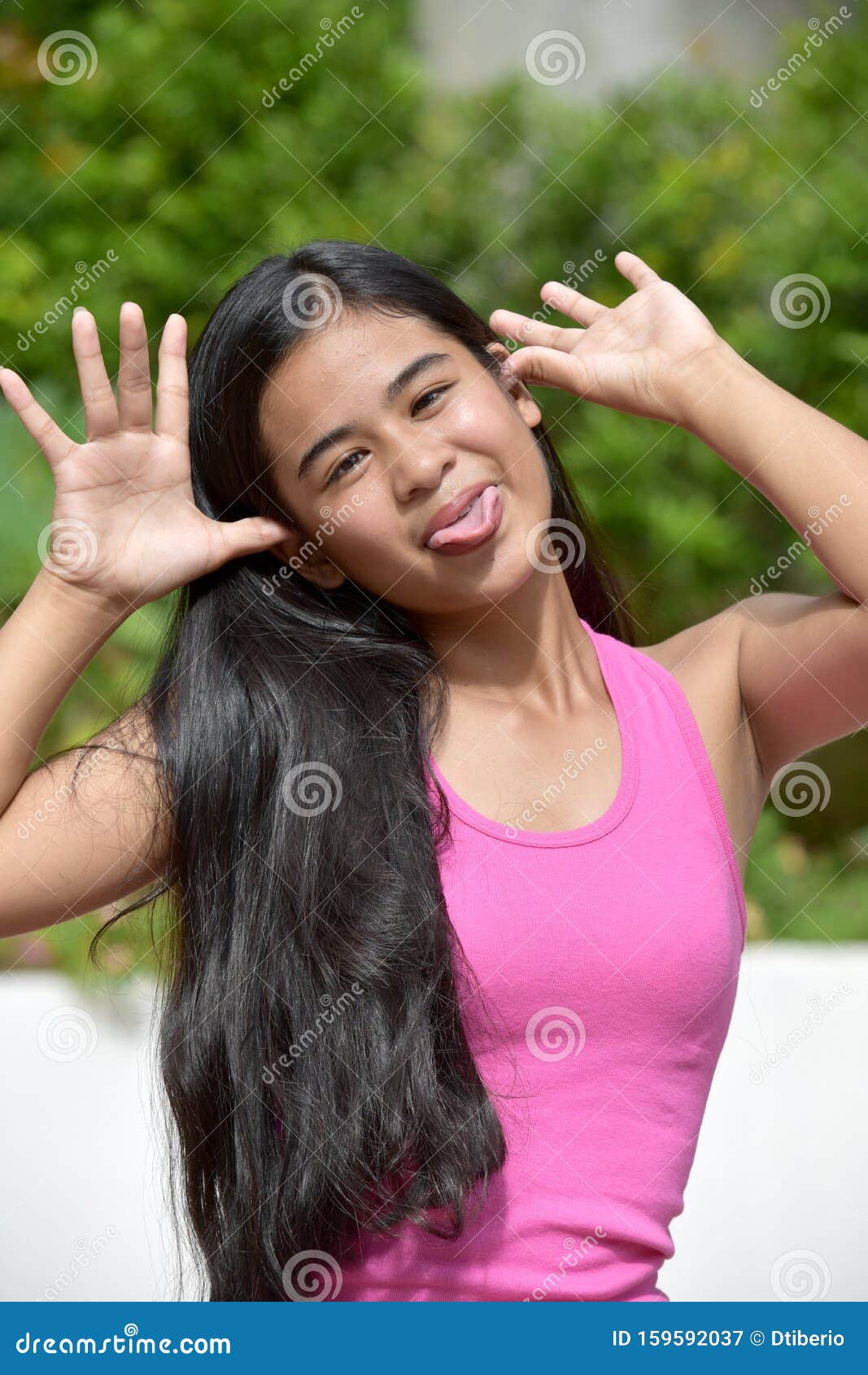A Girl Making Funny Faces stock image. Image of girl - 159592037