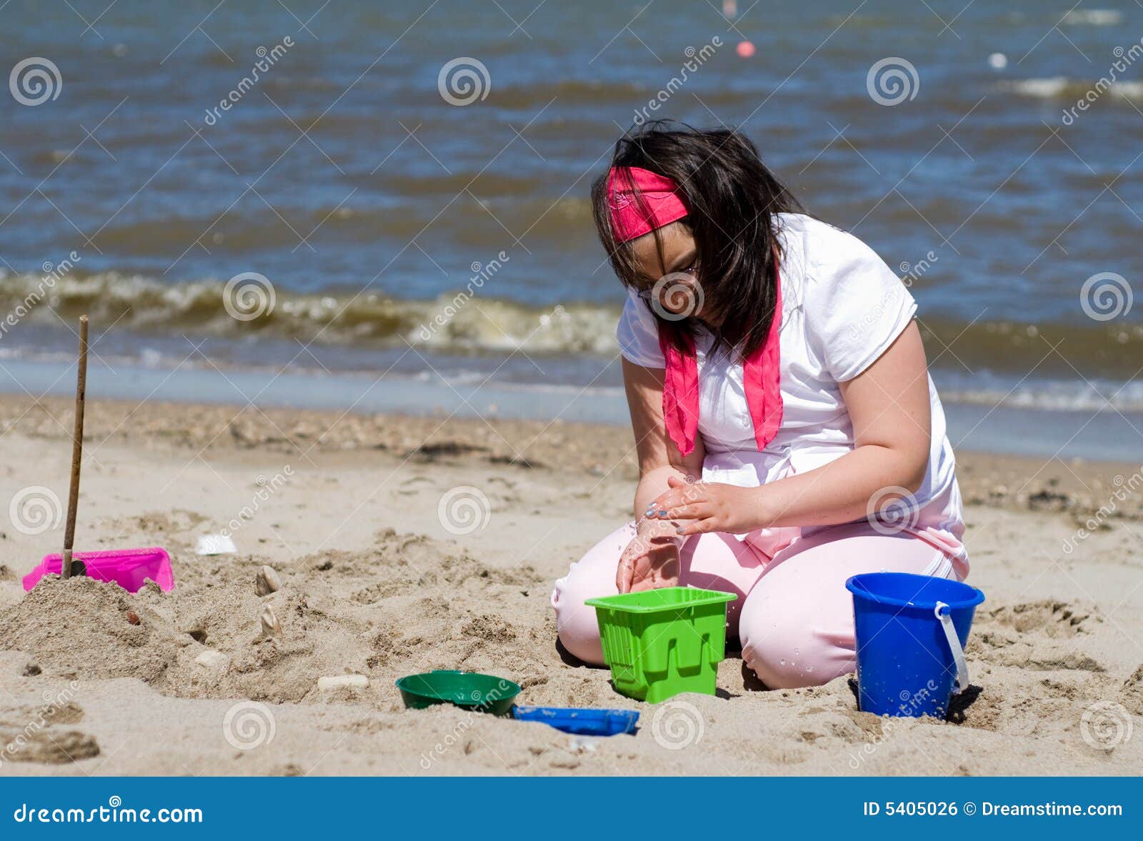 Girl Making Sand Castle stock photo. Image of structure - 5405026