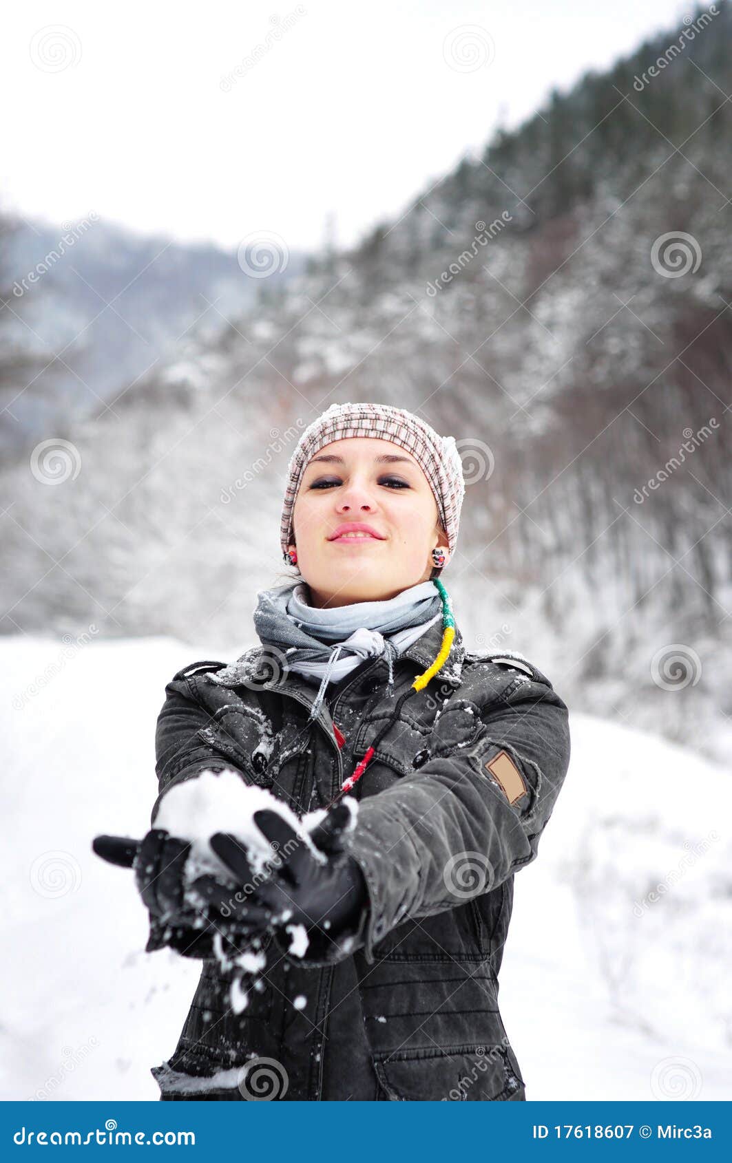 Girl making snowball stock image. Image of clothes, beautiful - 17618607
