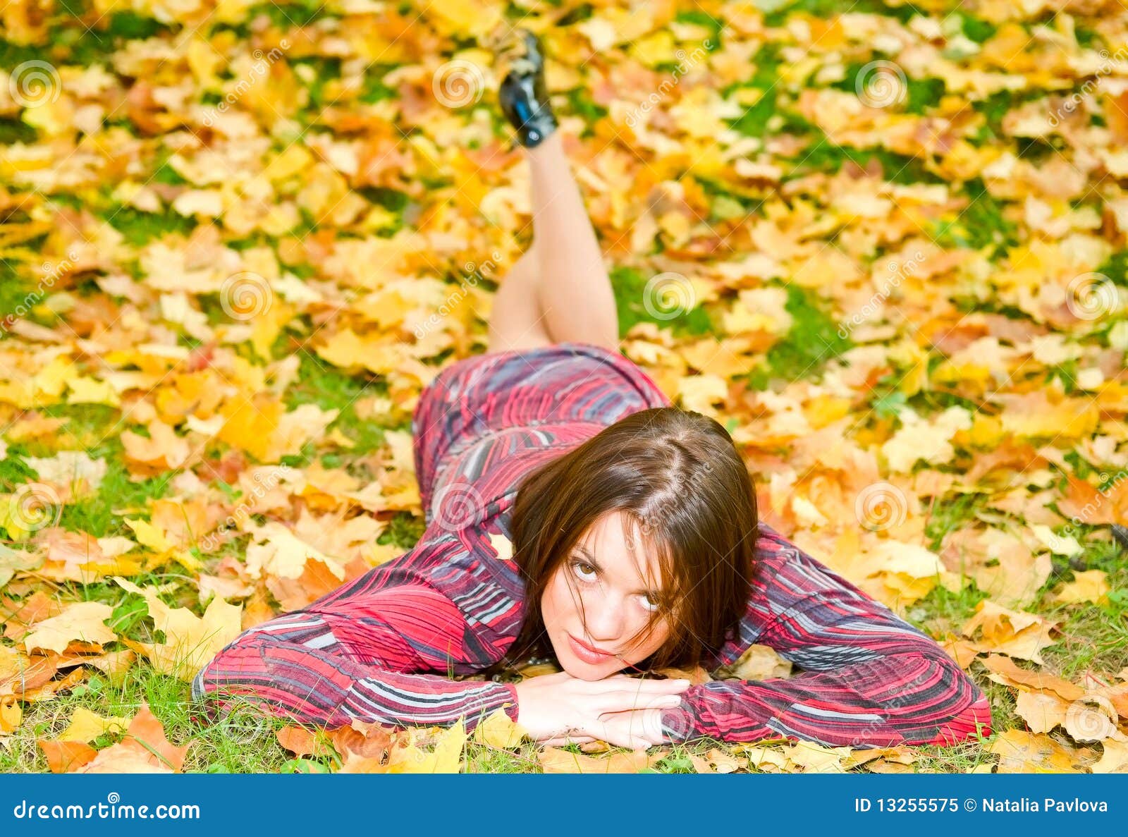 Girl on maple leaves stock image. Image of portrait, model - 13255575