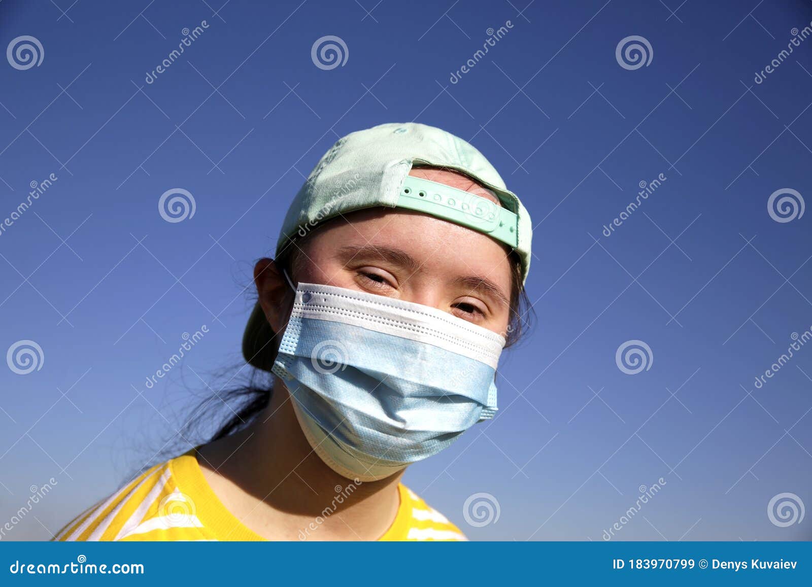 Girl in a Mask on Her Face on Background on a Blue Sky Stock Image ...