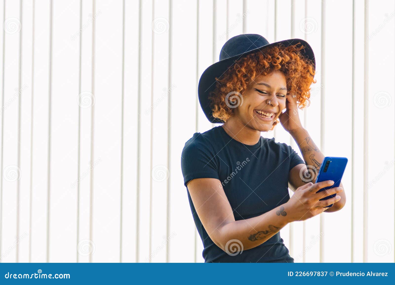 Girl with Mobile Phone and Hat Stock Image - Image of cell, female ...