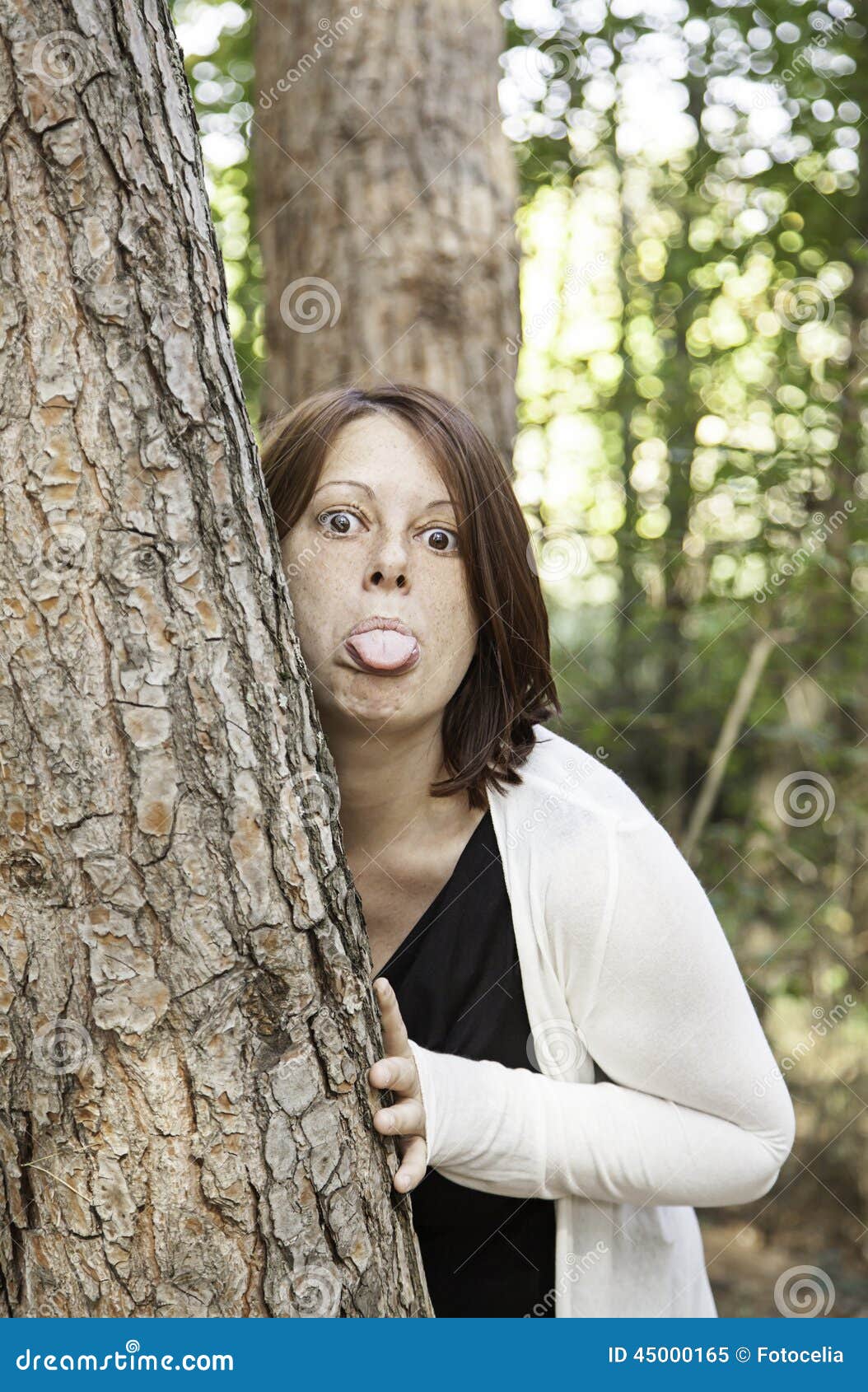 Girl mocking tree stock image. Image of caucasian, casual - 45000165