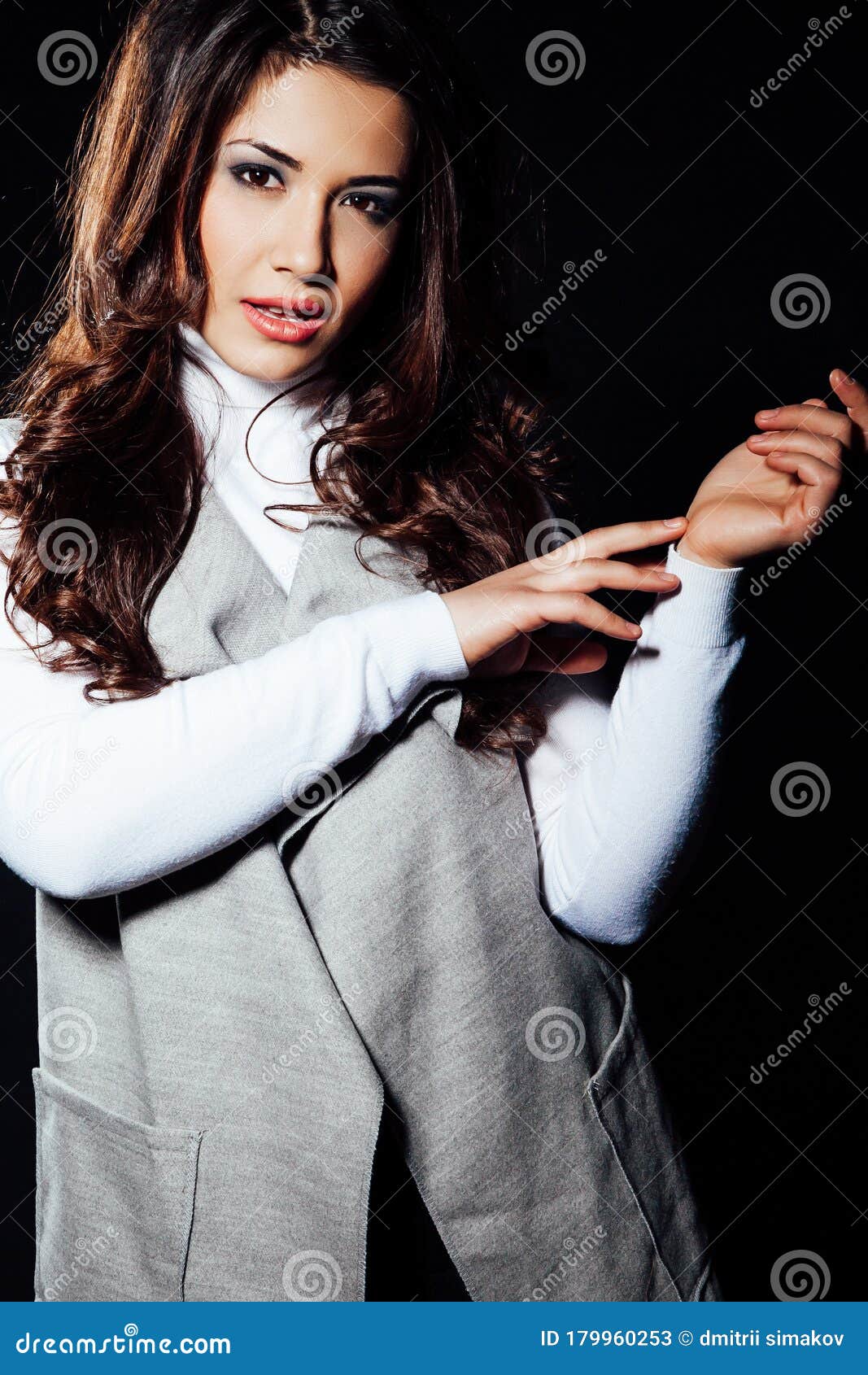 Girl Model Posing in the Studio on a Black Background Stock Image ...
