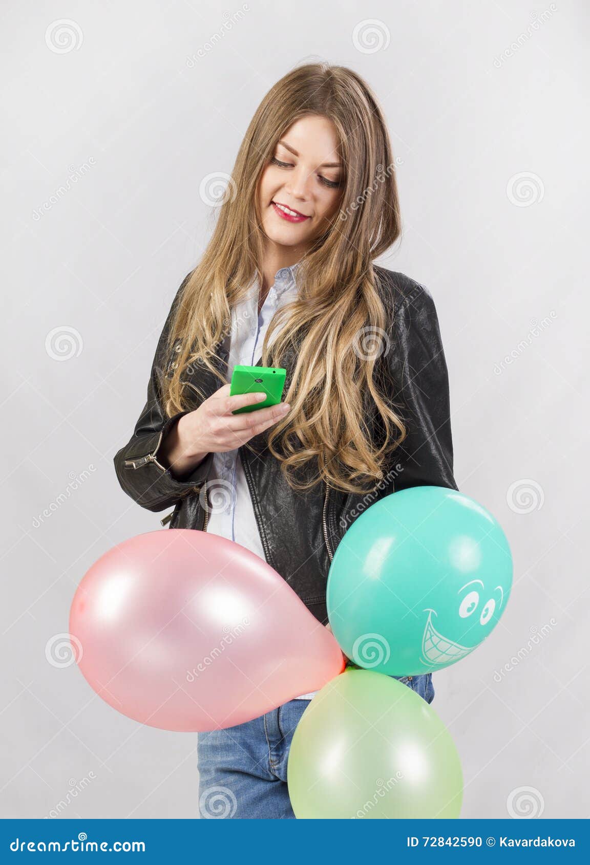 Girl Model in Studio with Balloons and Cell Phone Stock Photo - Image ...