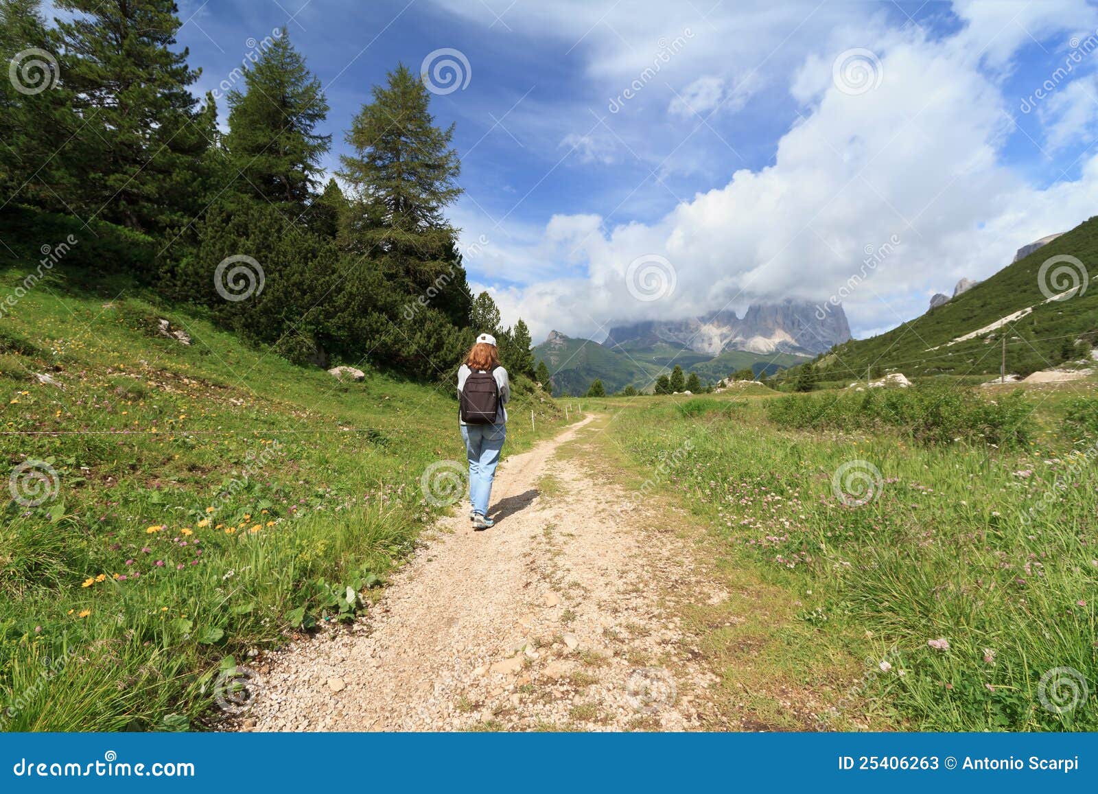 Girl on a mountain path stock image. Image of holiday - 25406263