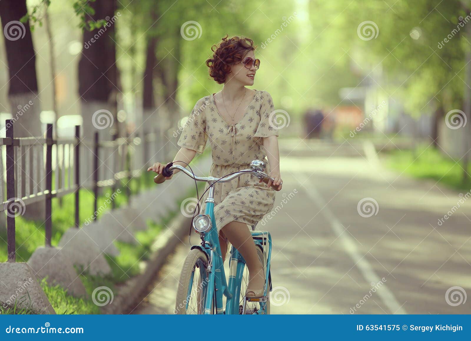 Girl moving on a bicycle stock image. Image of active - 63541575
