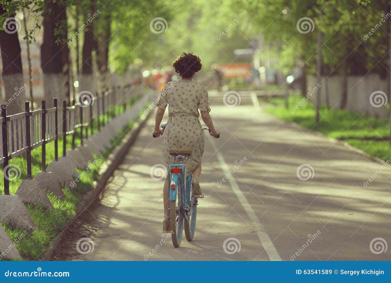 Girl moving on a bicycle stock image. Image of happiness - 63541589