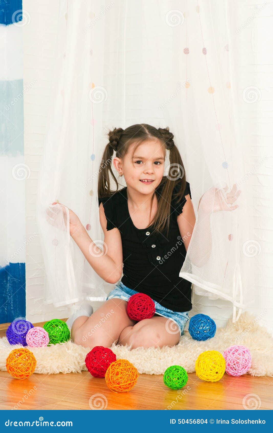 Girl with Multi-colored Balls Stock Photo - Image of child, years: 50456804