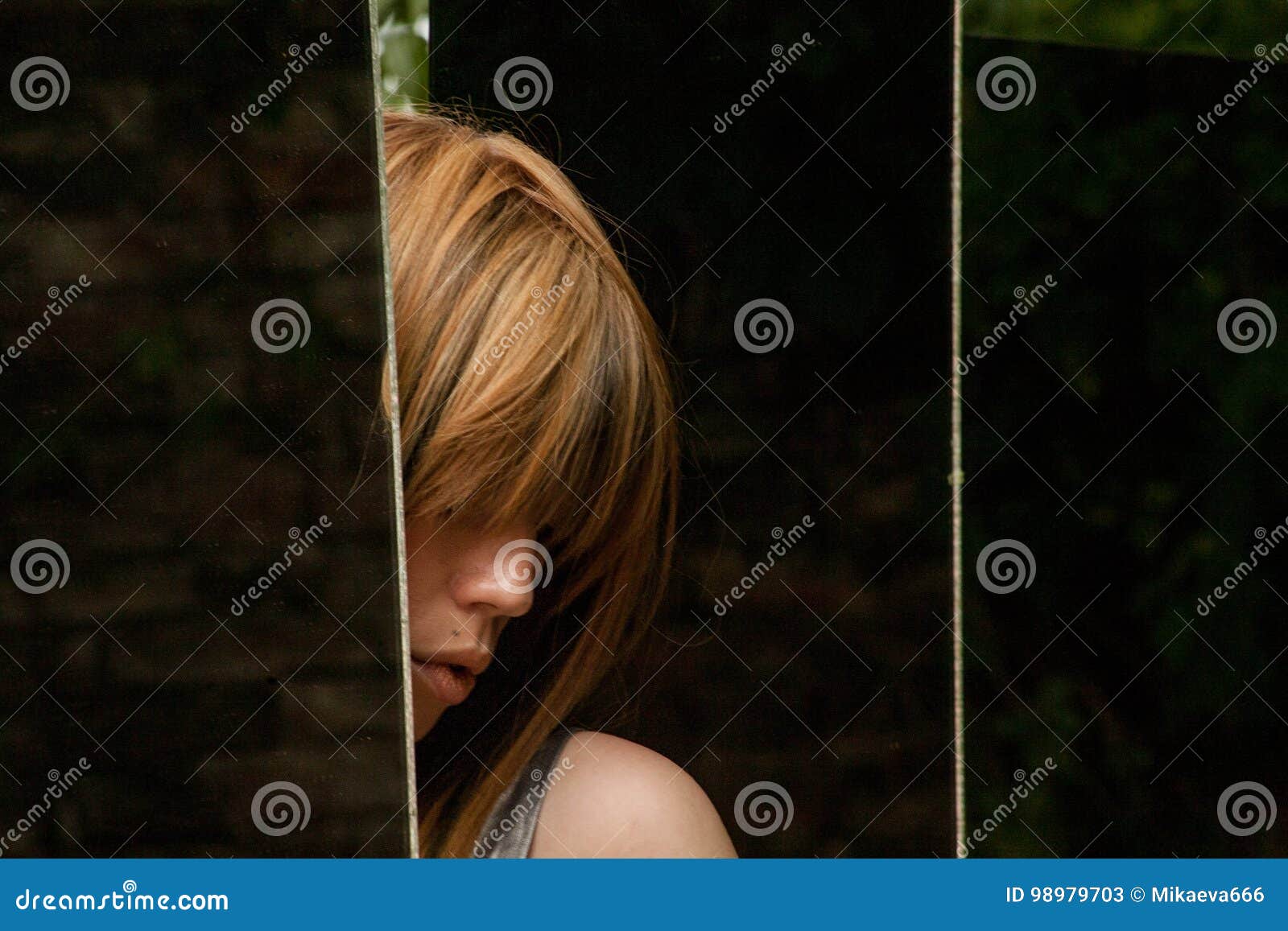 A Girl Looks Out between the Mirrors Stock Image - Image of outdoor ...