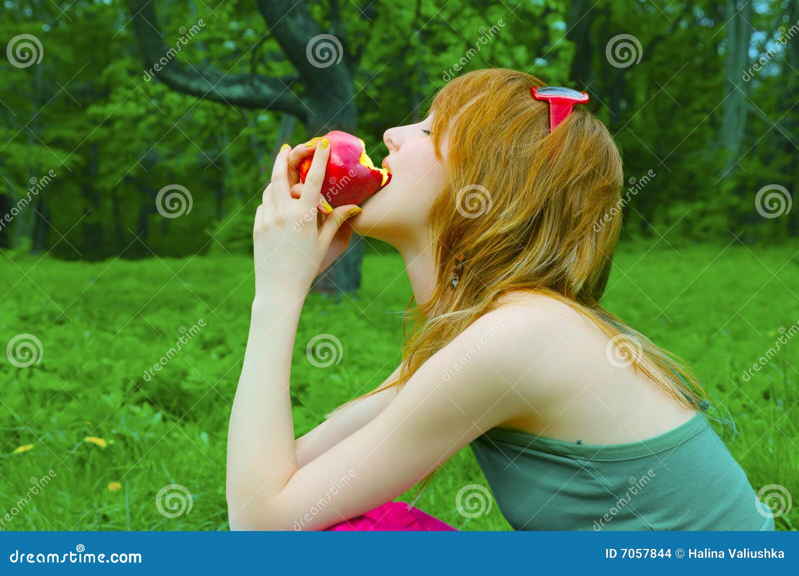 Girl nibble apple stock photo. Image of merry, filly, beautiful - 7057844