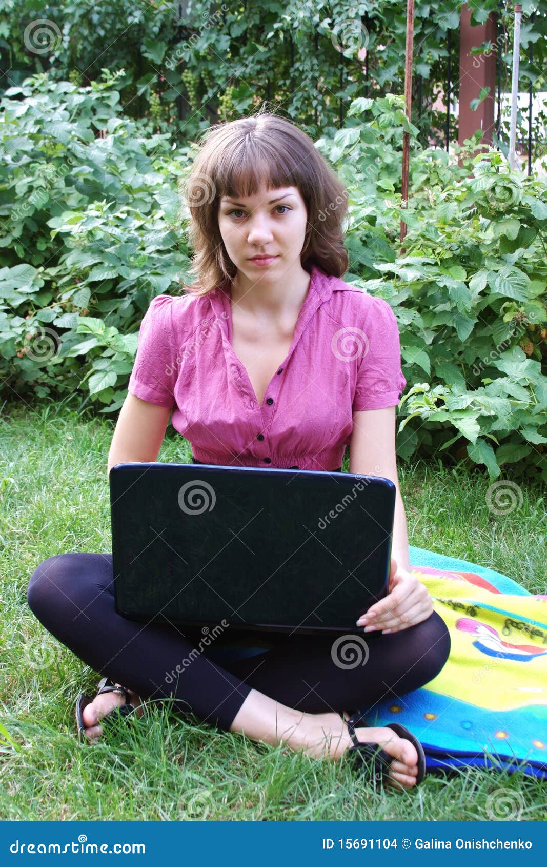 Girl with a notebook stock photo. Image of brunette, computer - 15691104
