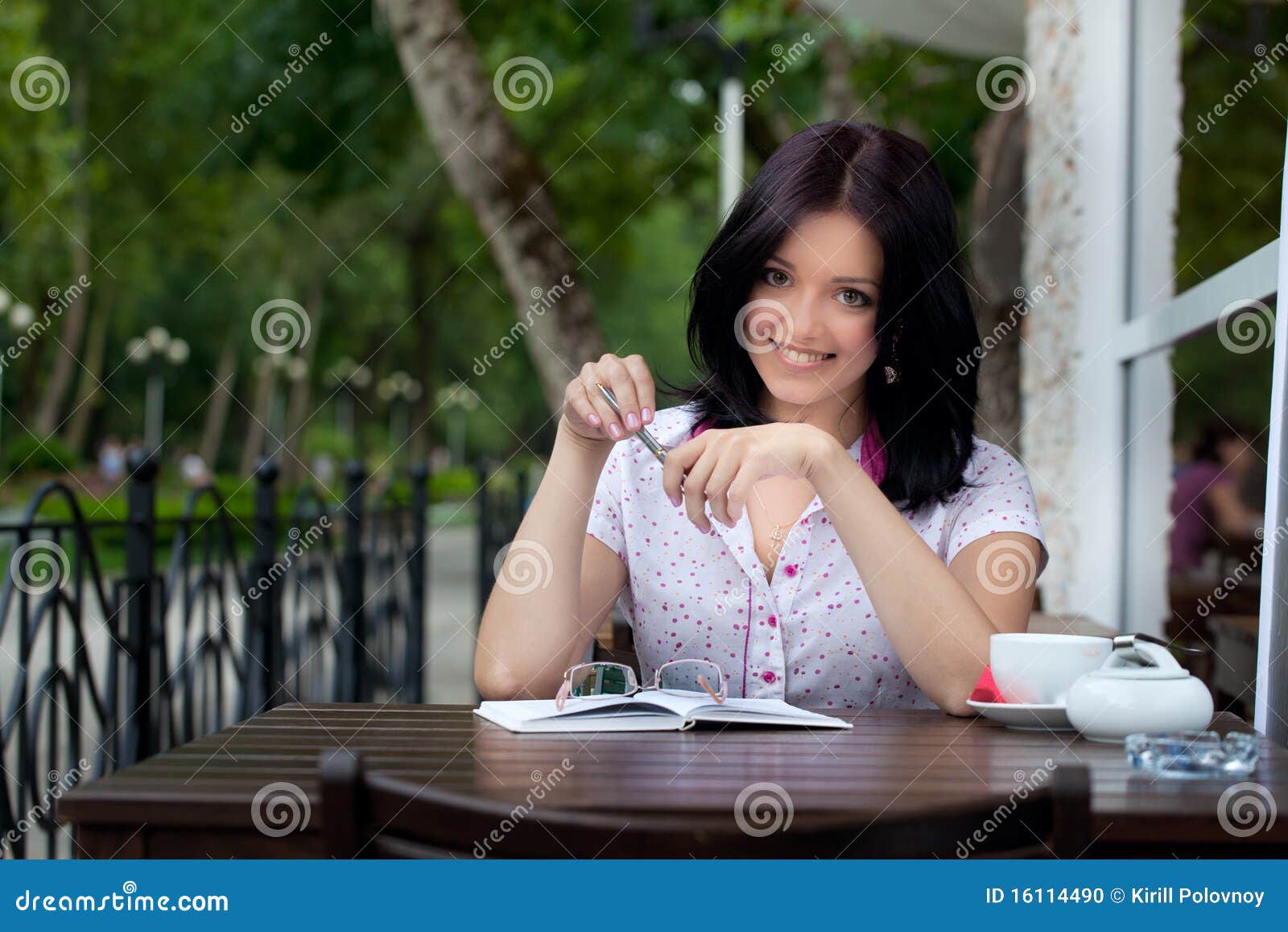Girl with notepad in cafe stock photo. Image of beauty - 16114490