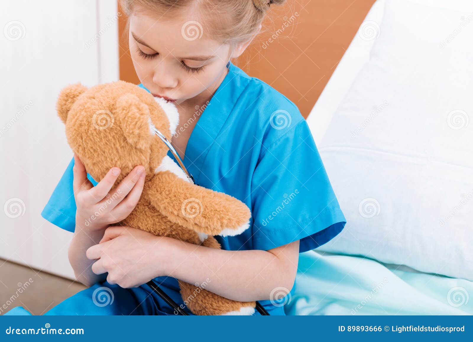 Girl Nurse Kissing Teddy Bear in Hospital Chamber Stock Photo - Image ... Girl Nurse Kissing Teddy Bear in Hospital Chamber Stock Photo - Image ...