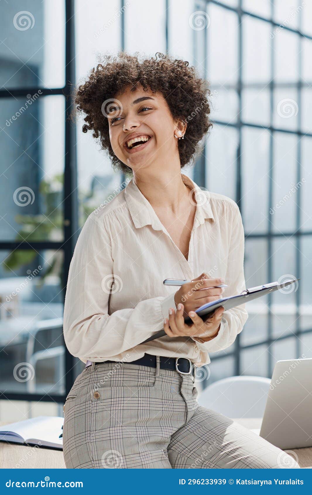 Girl in the Office Smiles Writing Notes Stock Image - Image of person ...