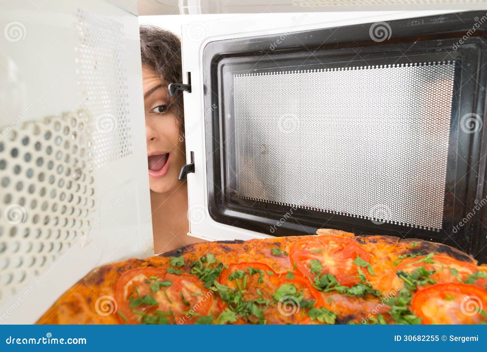 Girl open a microwave stock image. Image of kitchen, cheese - 30682255