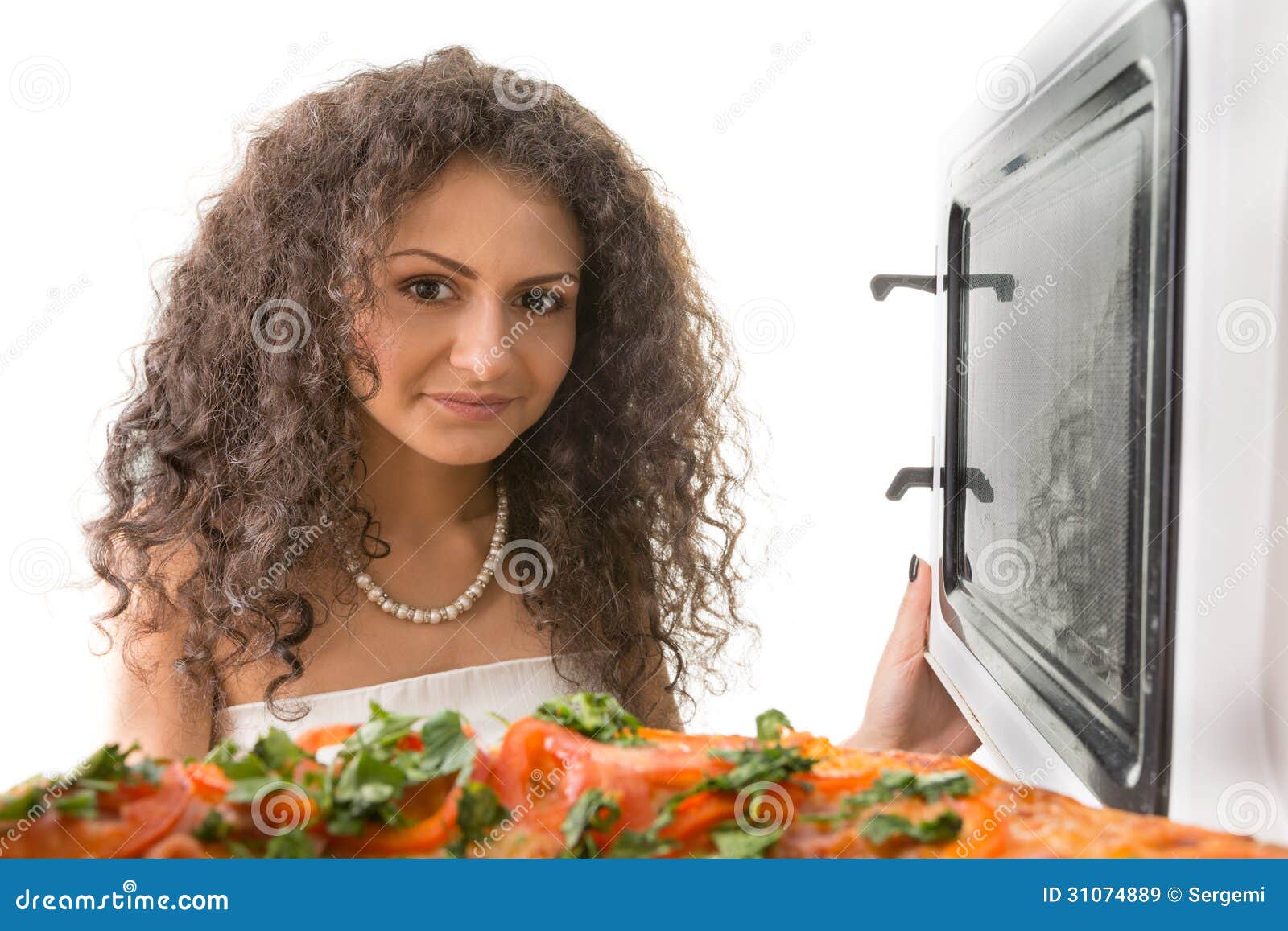 Girl open a microwave stock image. Image of greens, hand - 31074889
