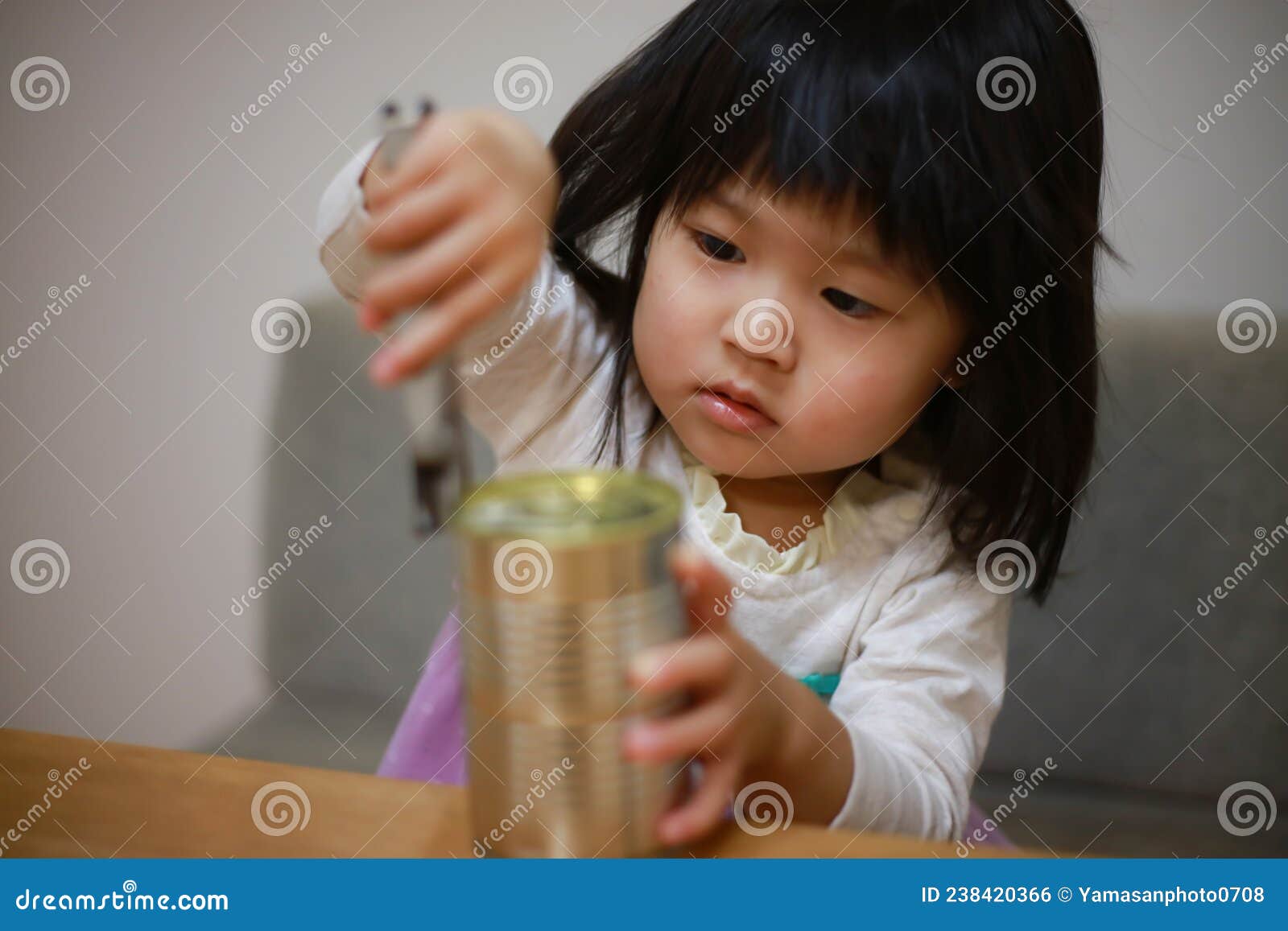 Girl opening a can stock photo. Image of smile, open - 238420366