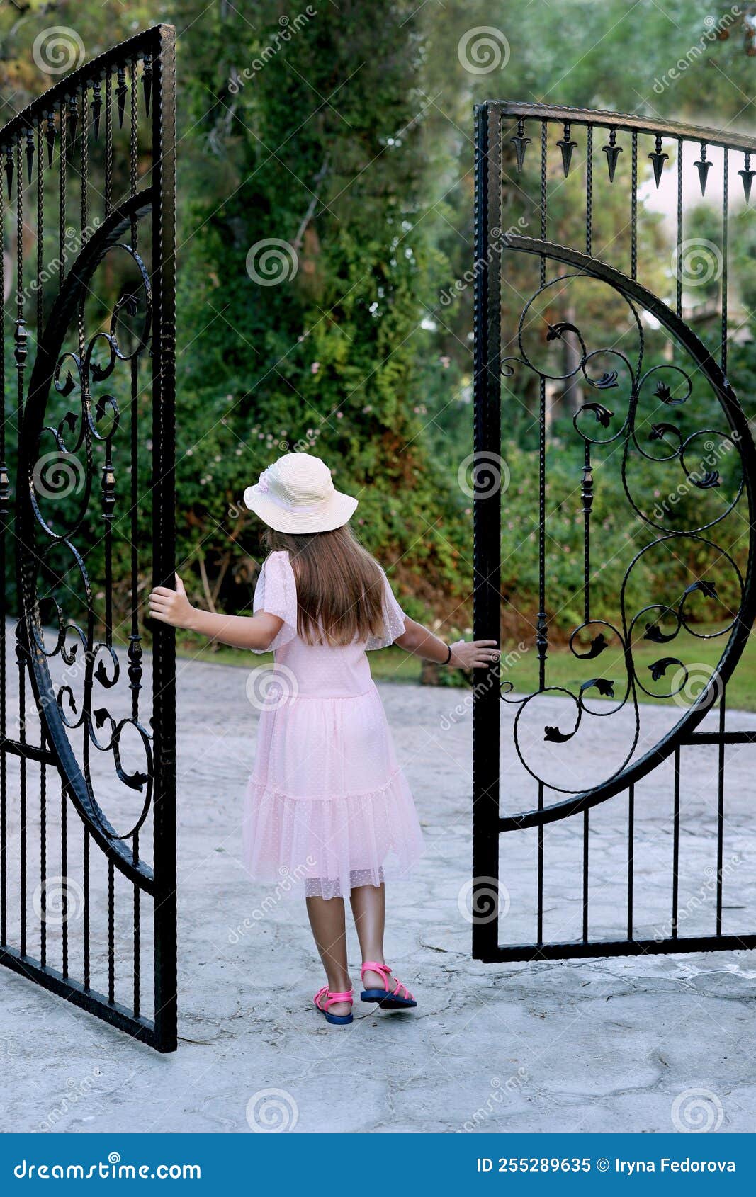 Girl Opens Wrought Iron Gate Stock Image - Image of pattern, park ...