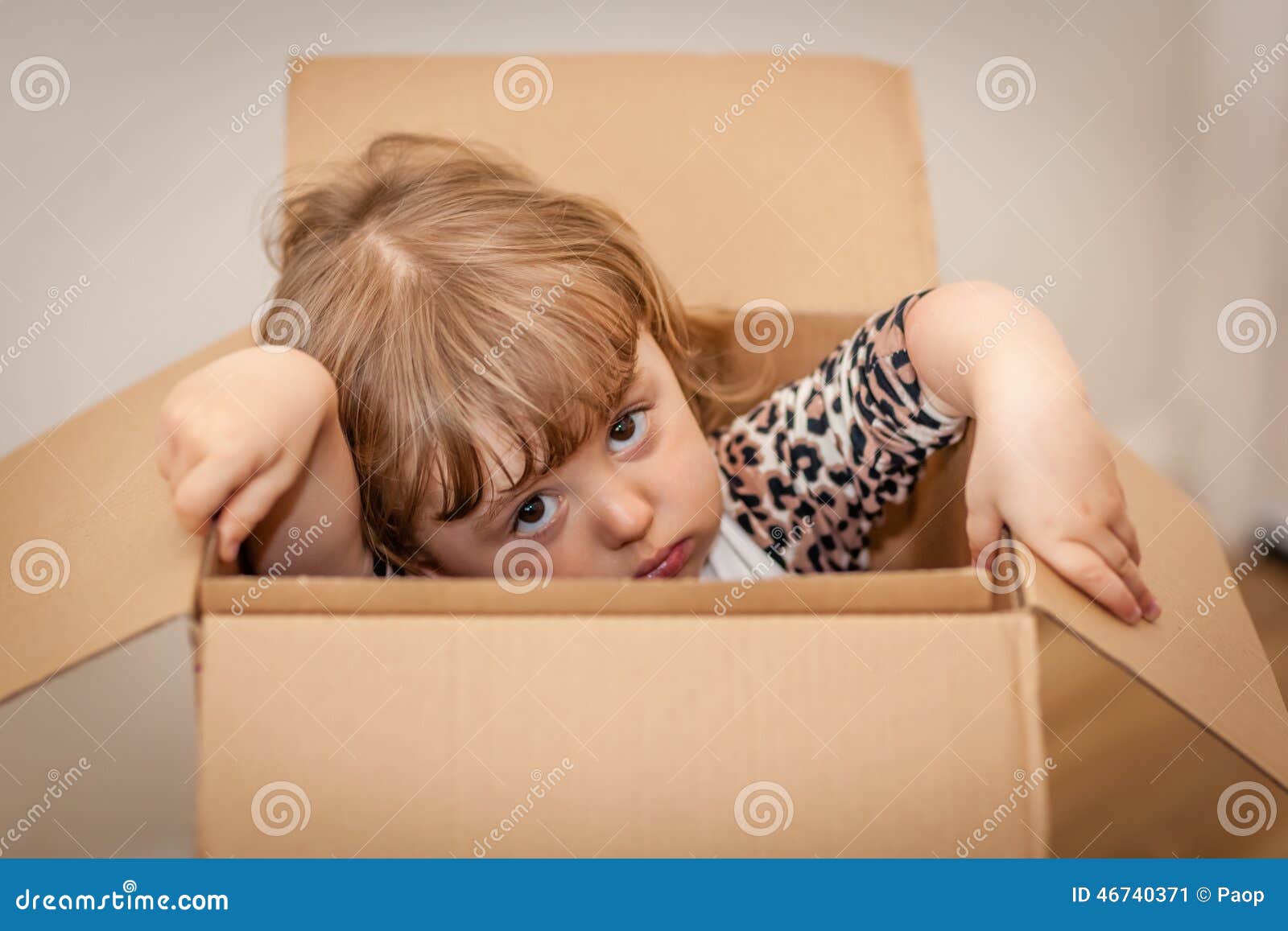 Girl out of the box stock image. Image of excited, home - 46740371