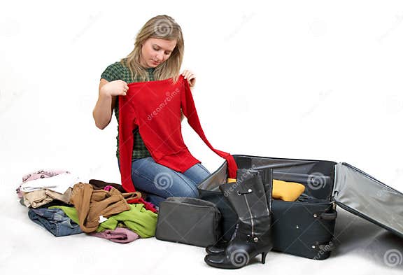 Girl is packing clothes stock photo. Image of dress, huge - 2117266
