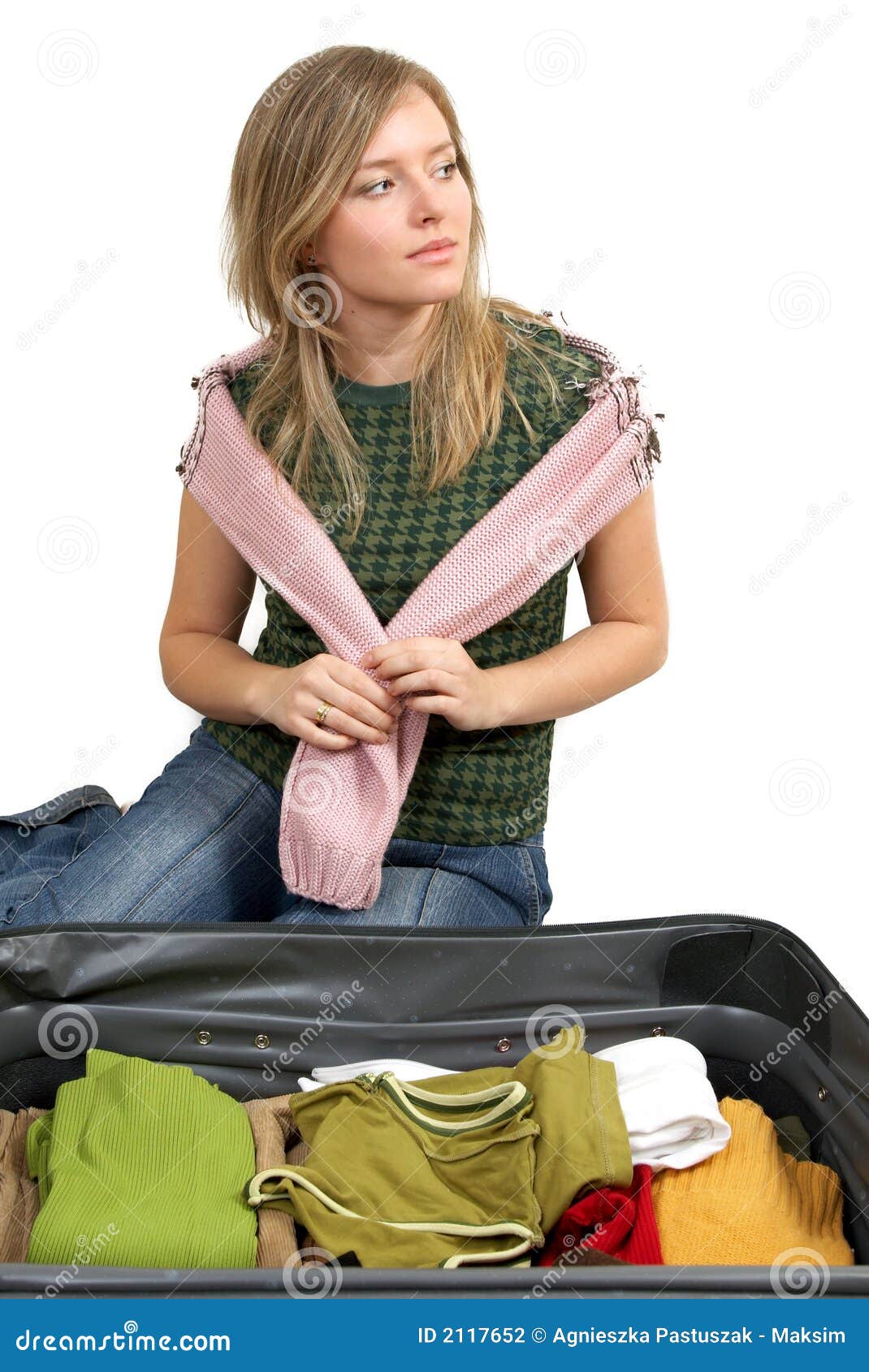 Girl is packing clothes stock photo. Image of woman, attractive - 2117652