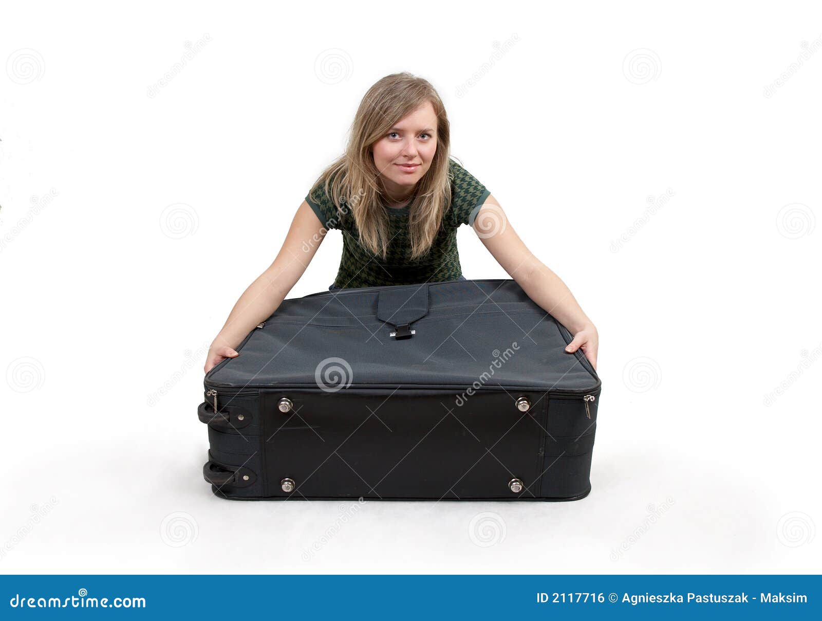 Girl is packing clothes stock photo. Image of gearing - 2117716