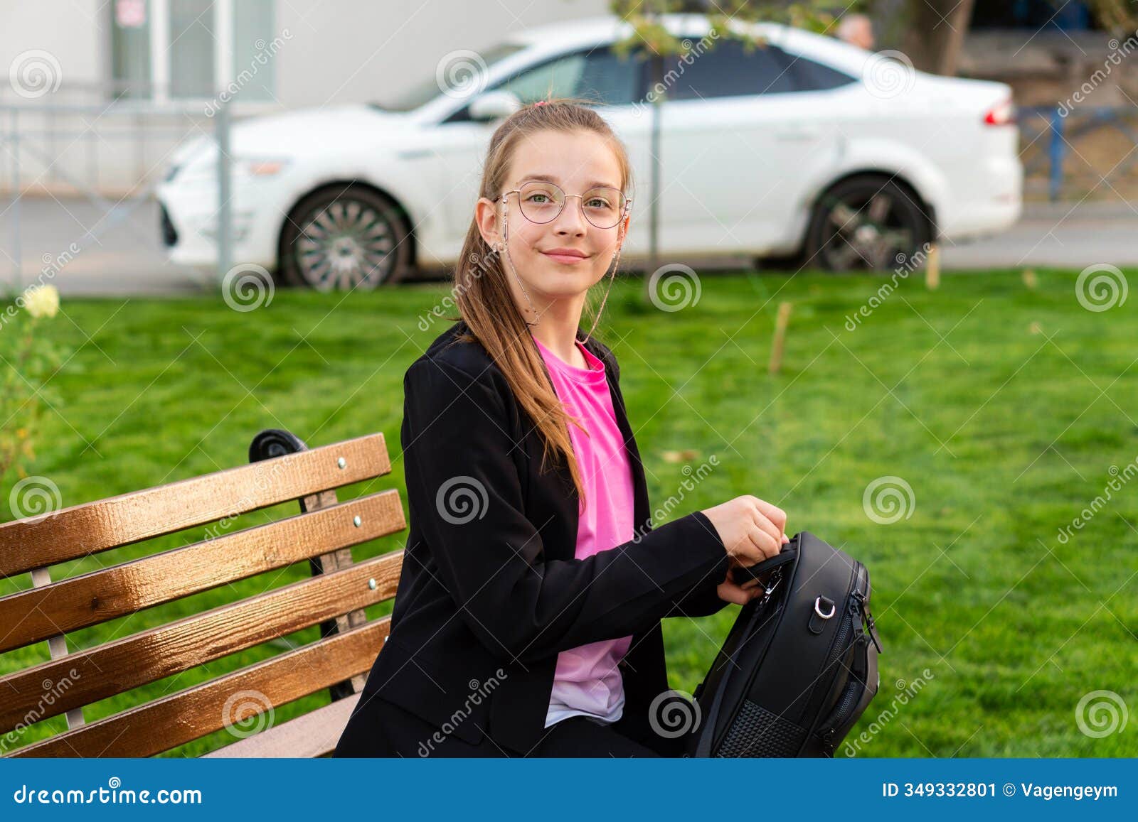Girl Packing Her Backpack in Park Stock Image - Image of portrait ...