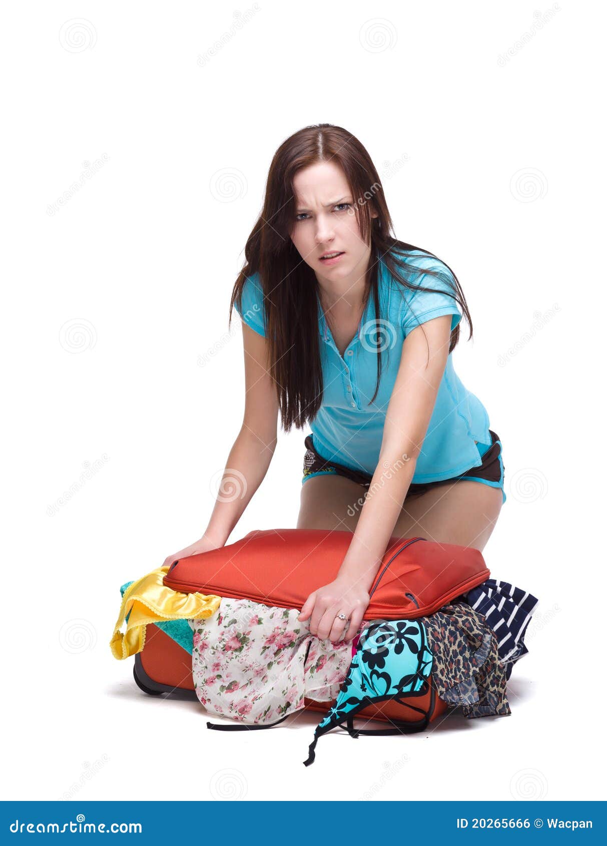 Girl packing suitcase stock photo. Image of interior - 20265666